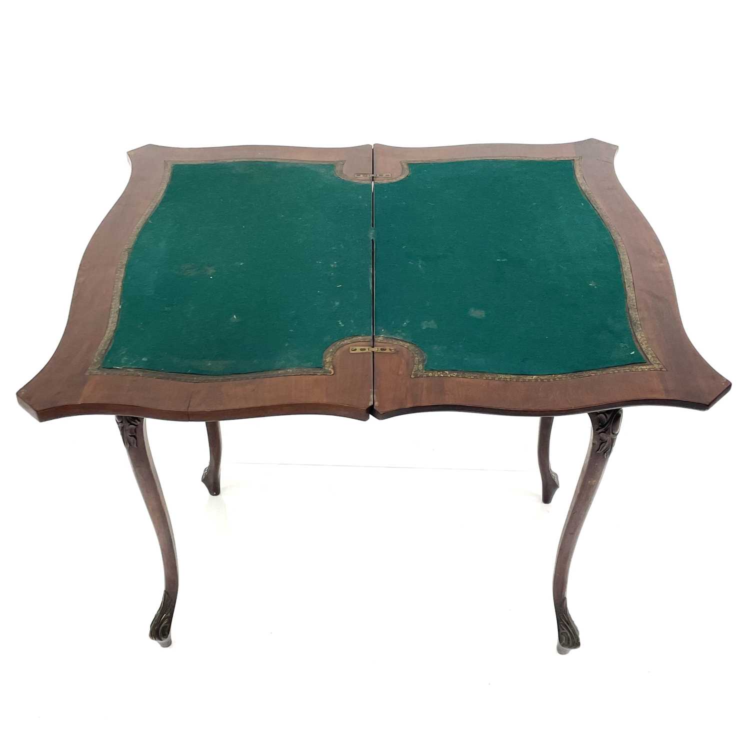 Lot 1889 - An Edwardian walnut fold top card table,