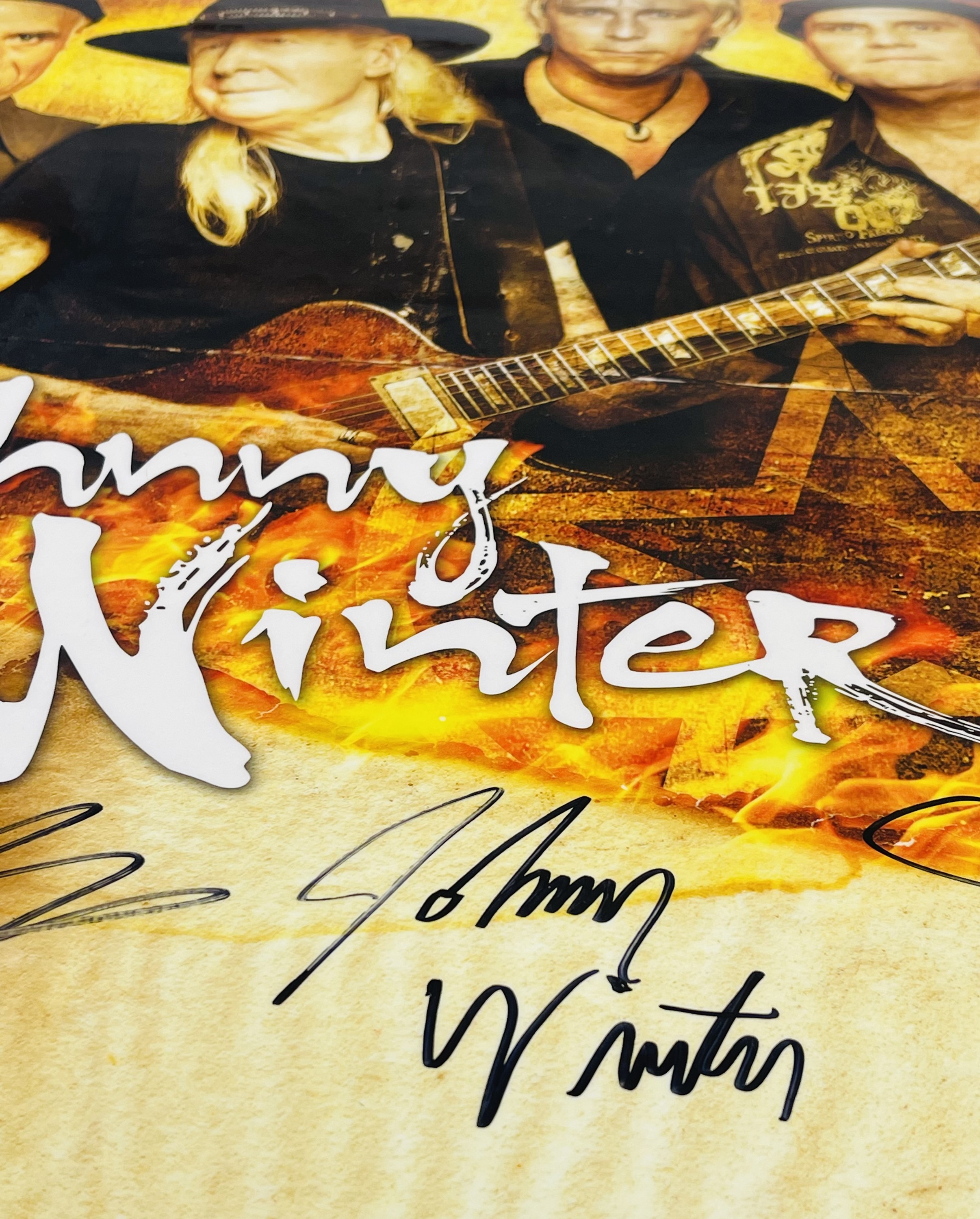 Lot 43 - A signed Johnny Winter poster.