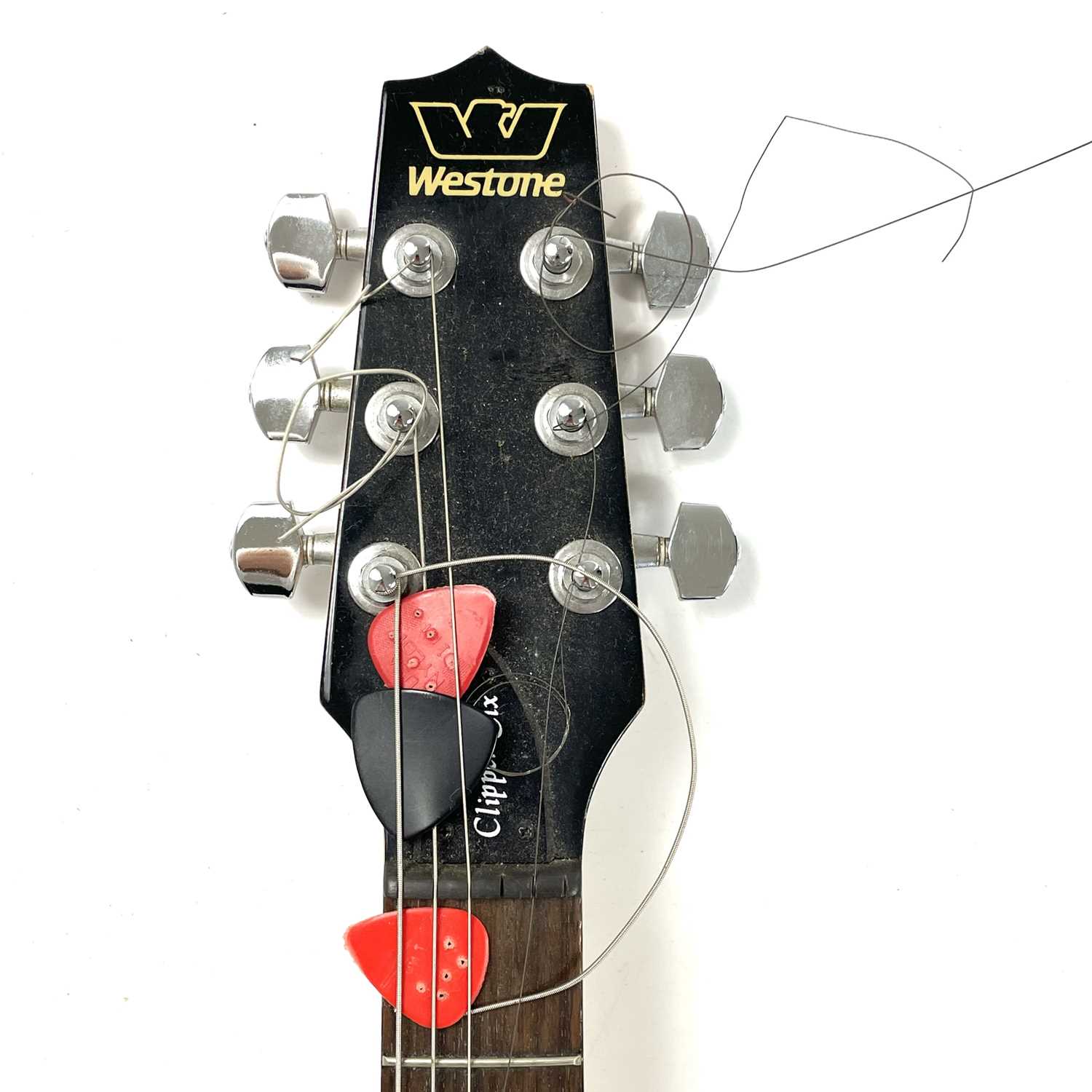 Lot 45 - A SIGNED 'STATUS QUO' GUITAR.