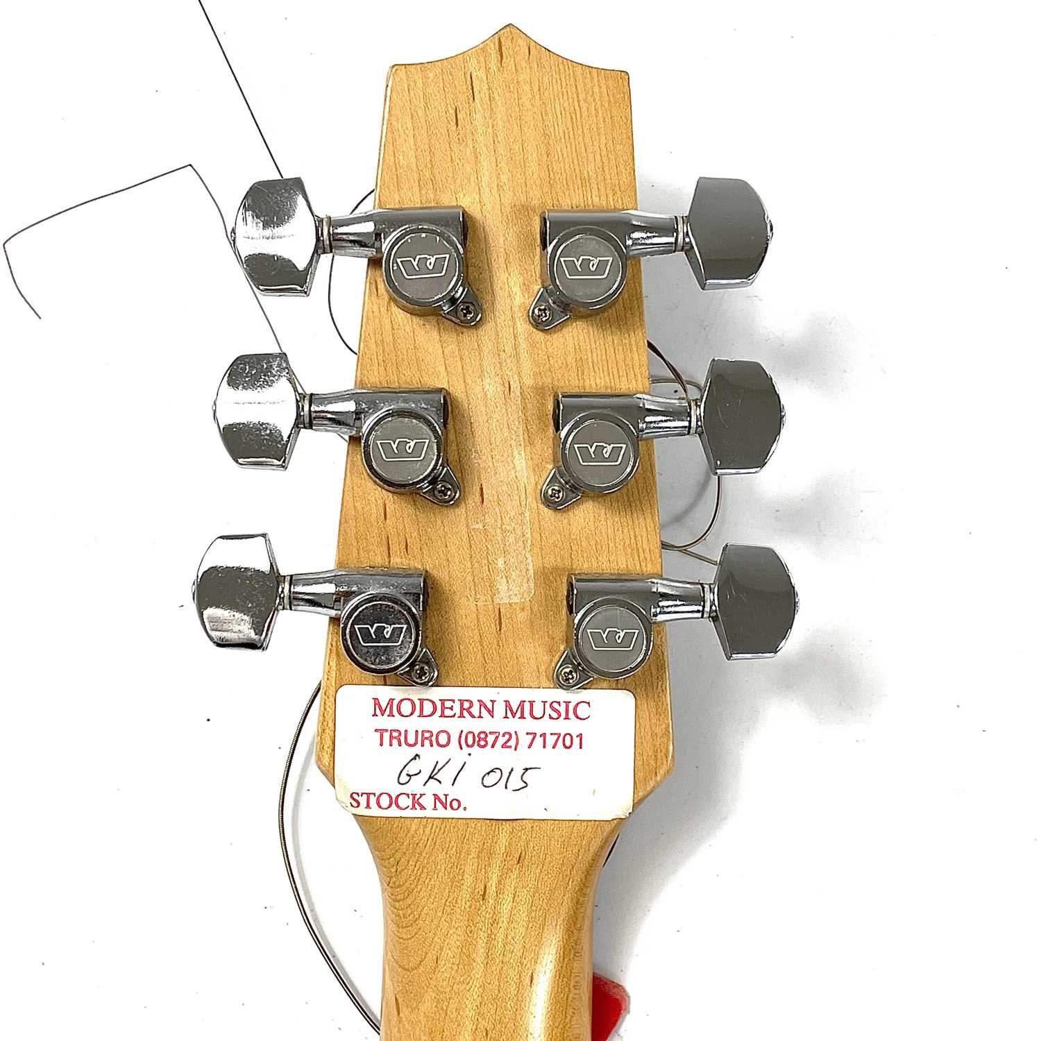 Lot 45 - A SIGNED 'STATUS QUO' GUITAR.
