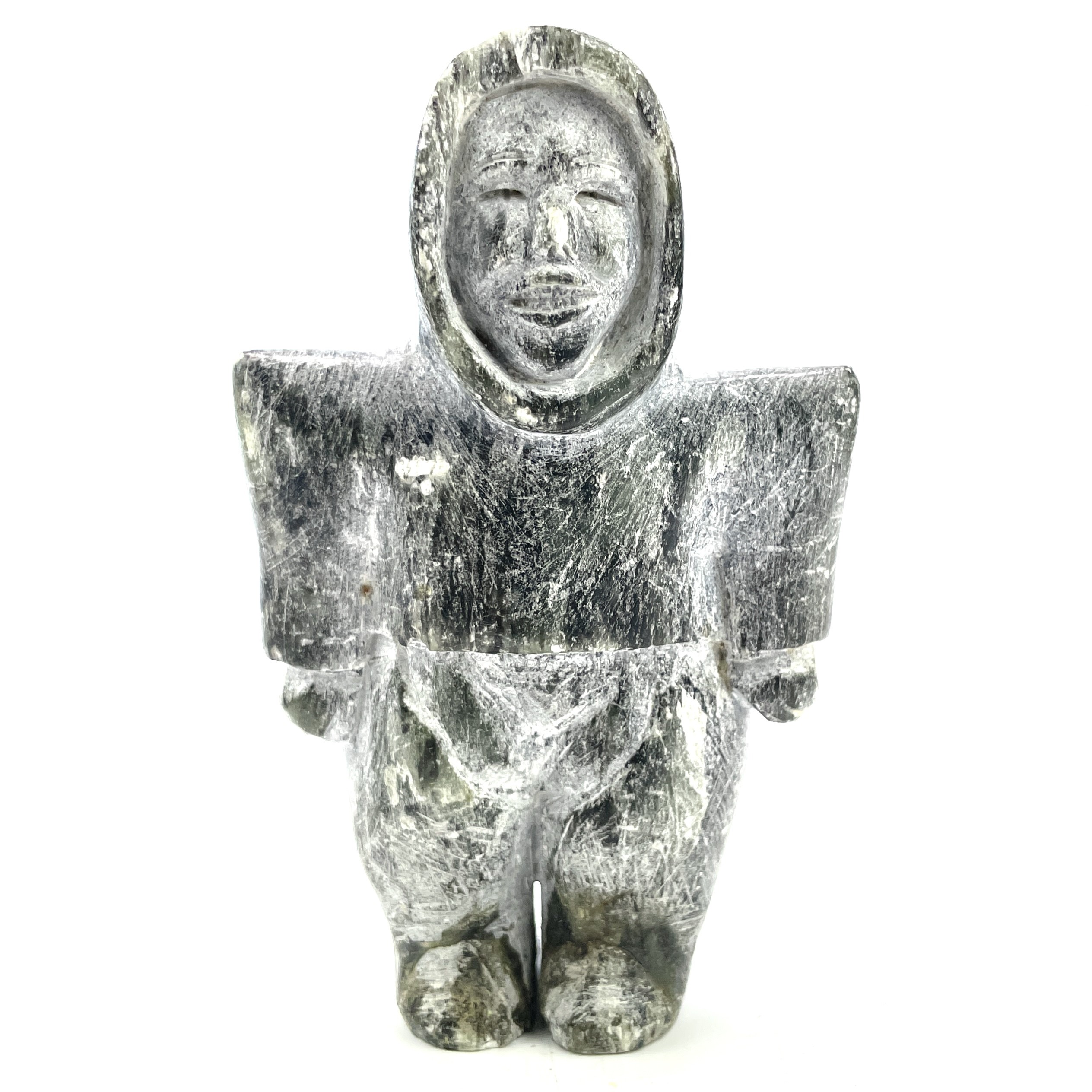 Lot 26 - An Inuit soapstone carving of a standing