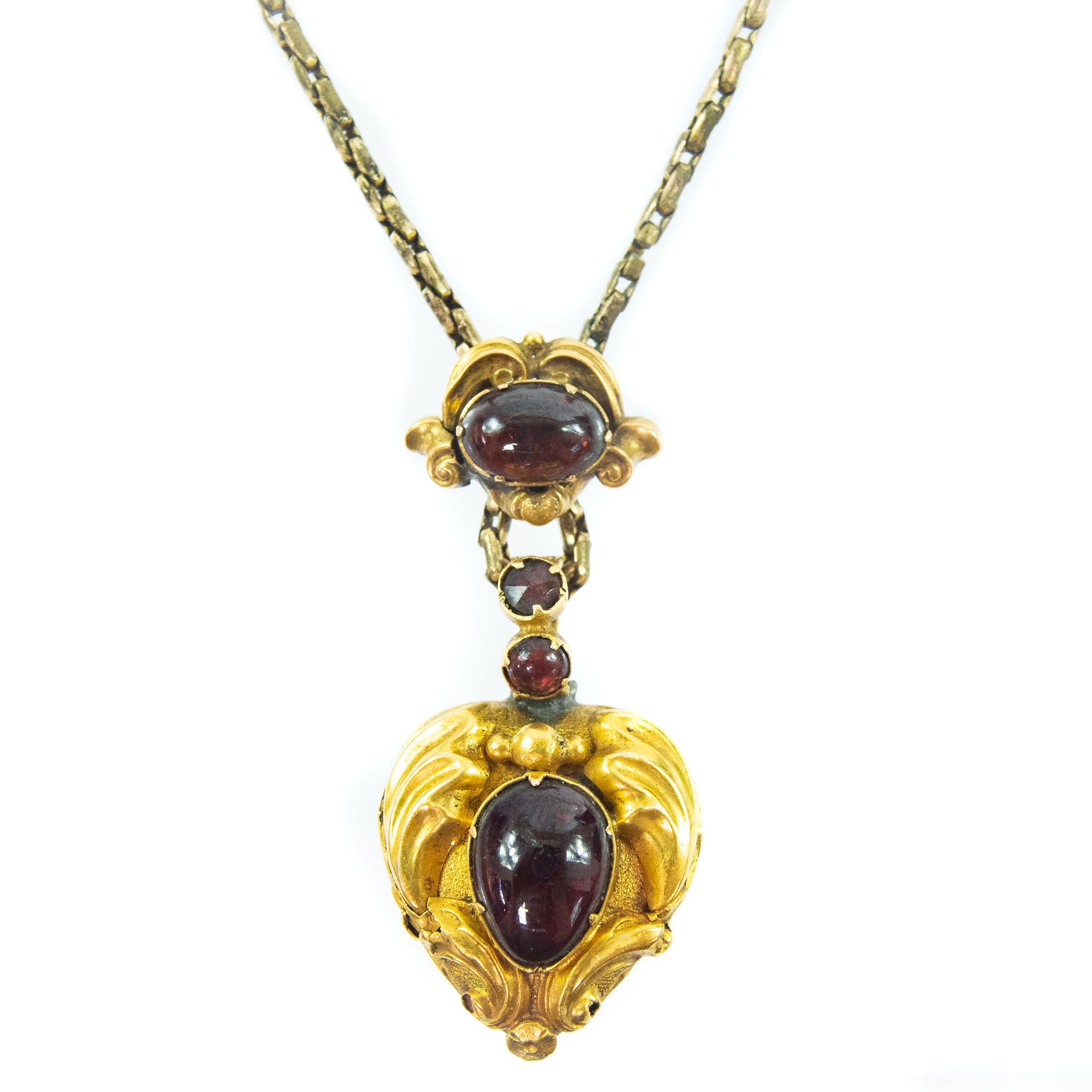 Lot 108 - A Victorian gold carbuncle garnet set heart