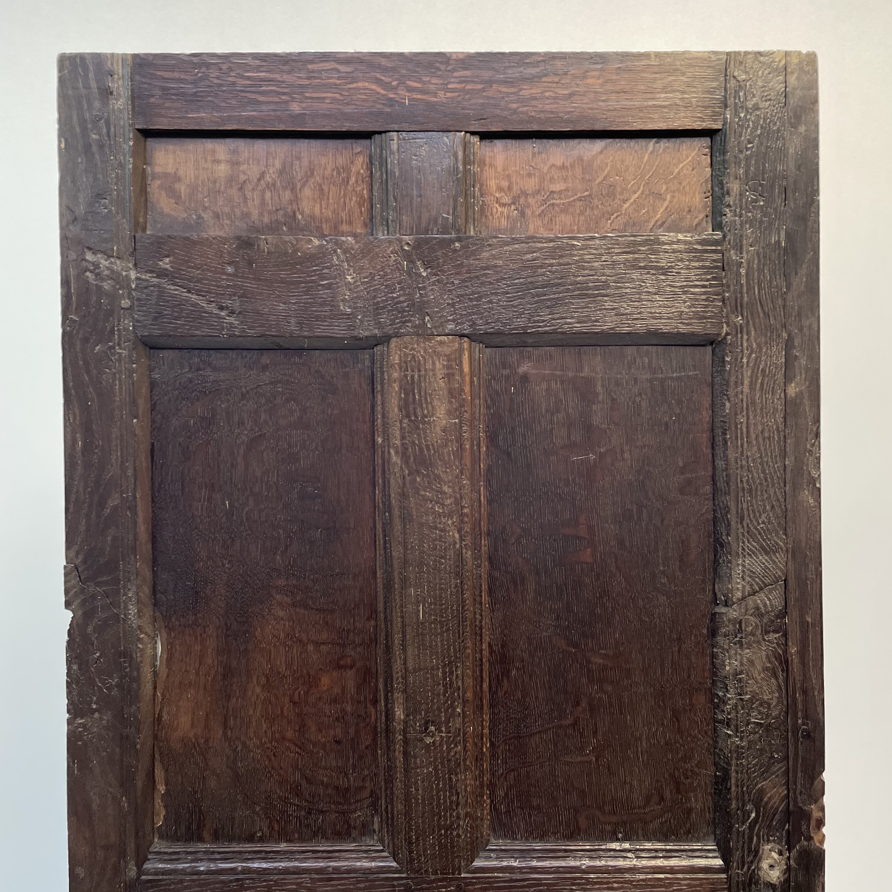 Lot 110 - A section of rectangular oak panelling, late