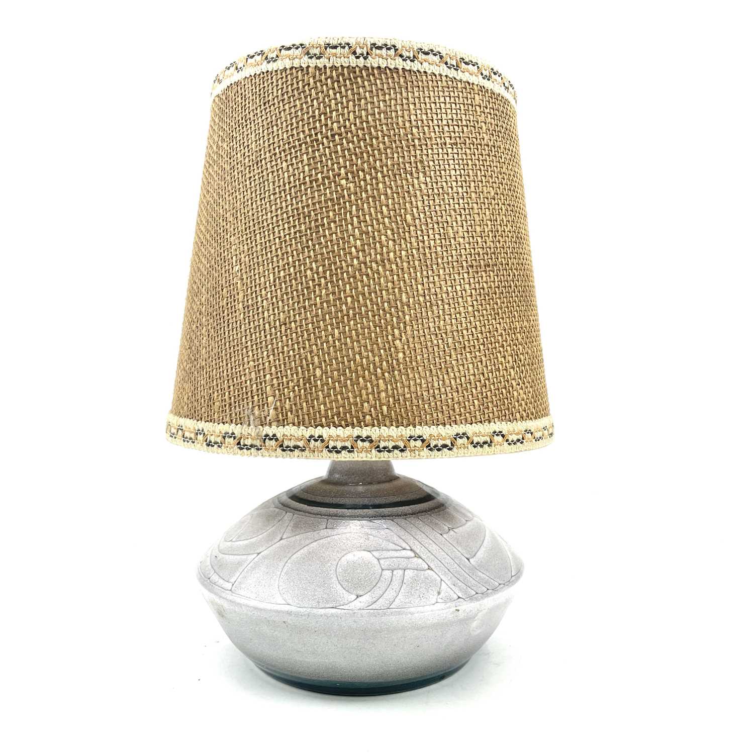 Lot 822 - A Celtic pottery table lamp, of slightly