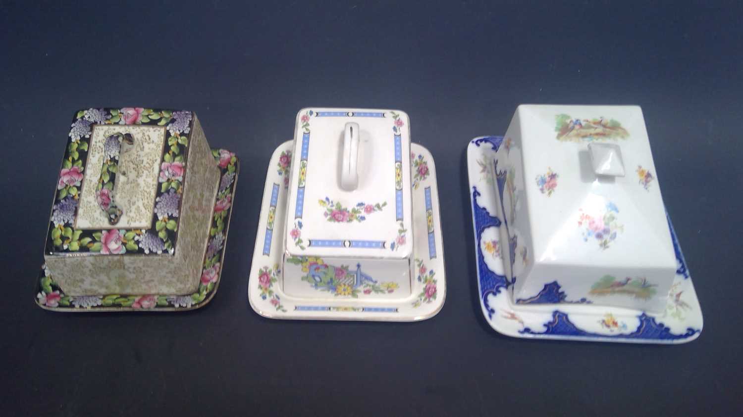 Lot 109 - Three Cheese Dishes, Two Wade Butter Dishes,