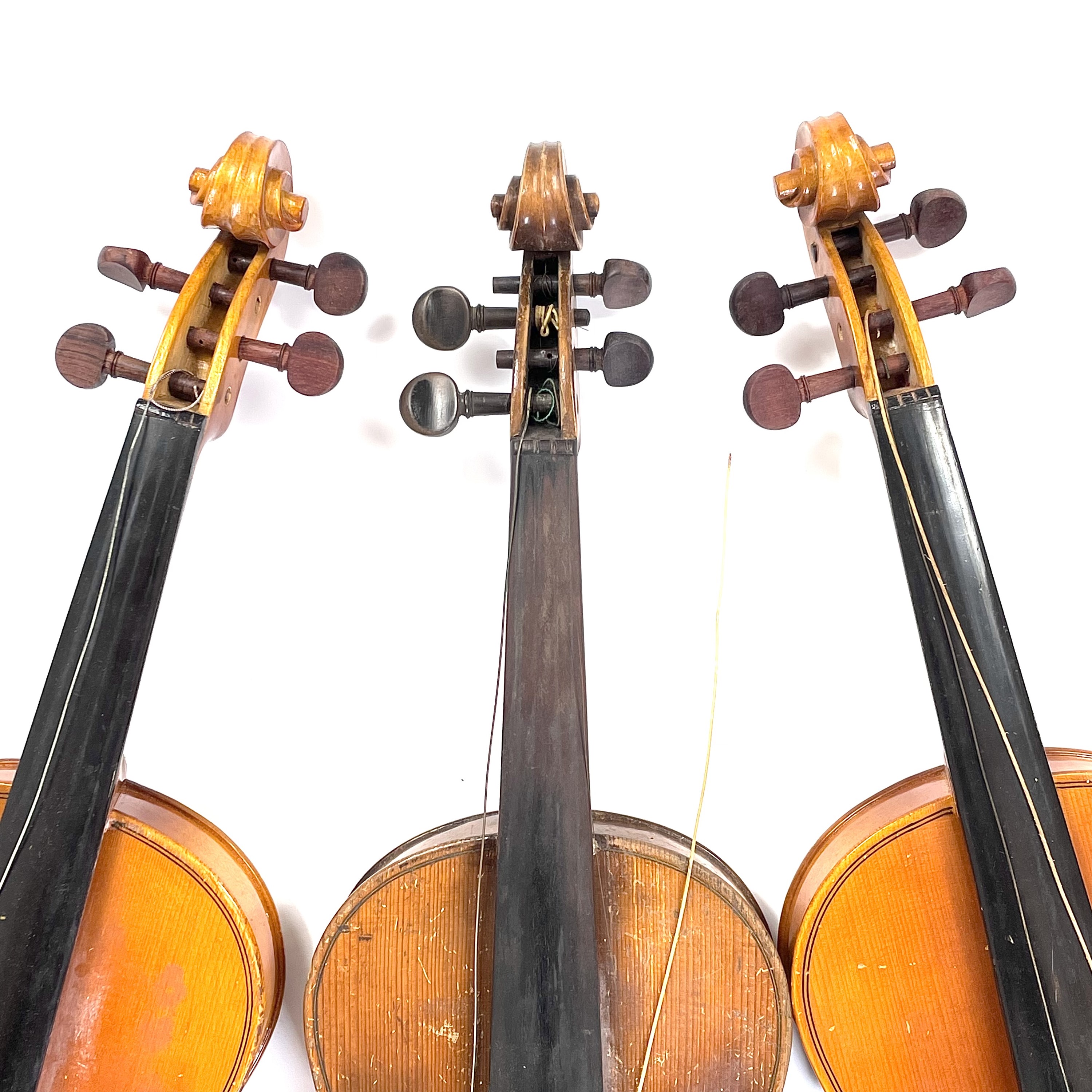Lot 220 - Three cased violins