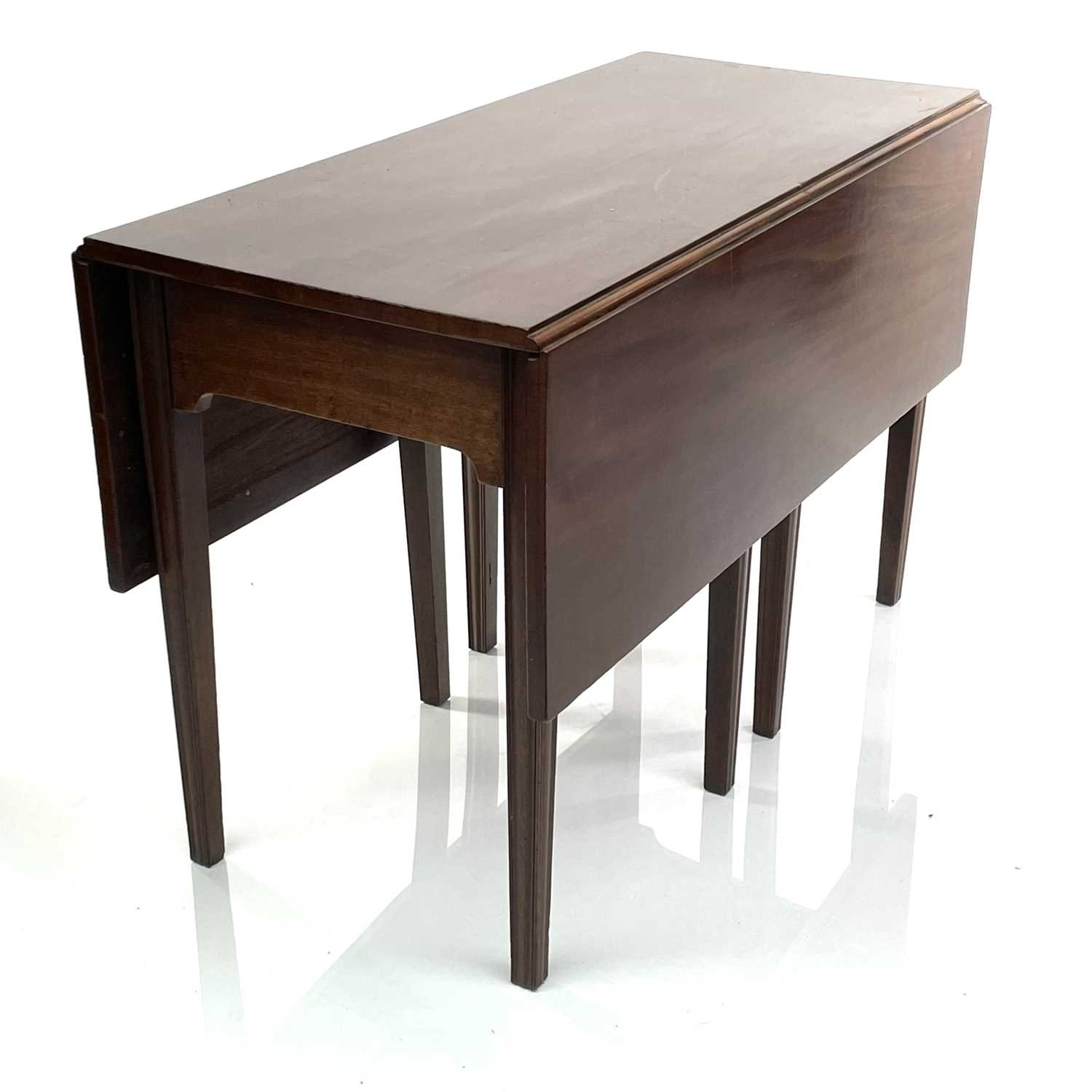 Lot 1933 - A George III mahogany twin flap dining