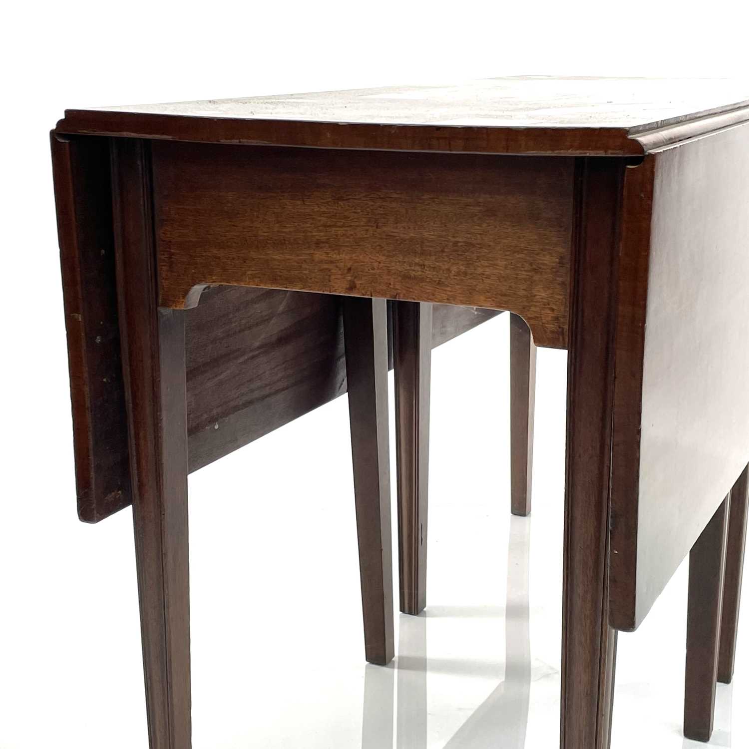 Lot 1933 - A George III mahogany twin flap dining