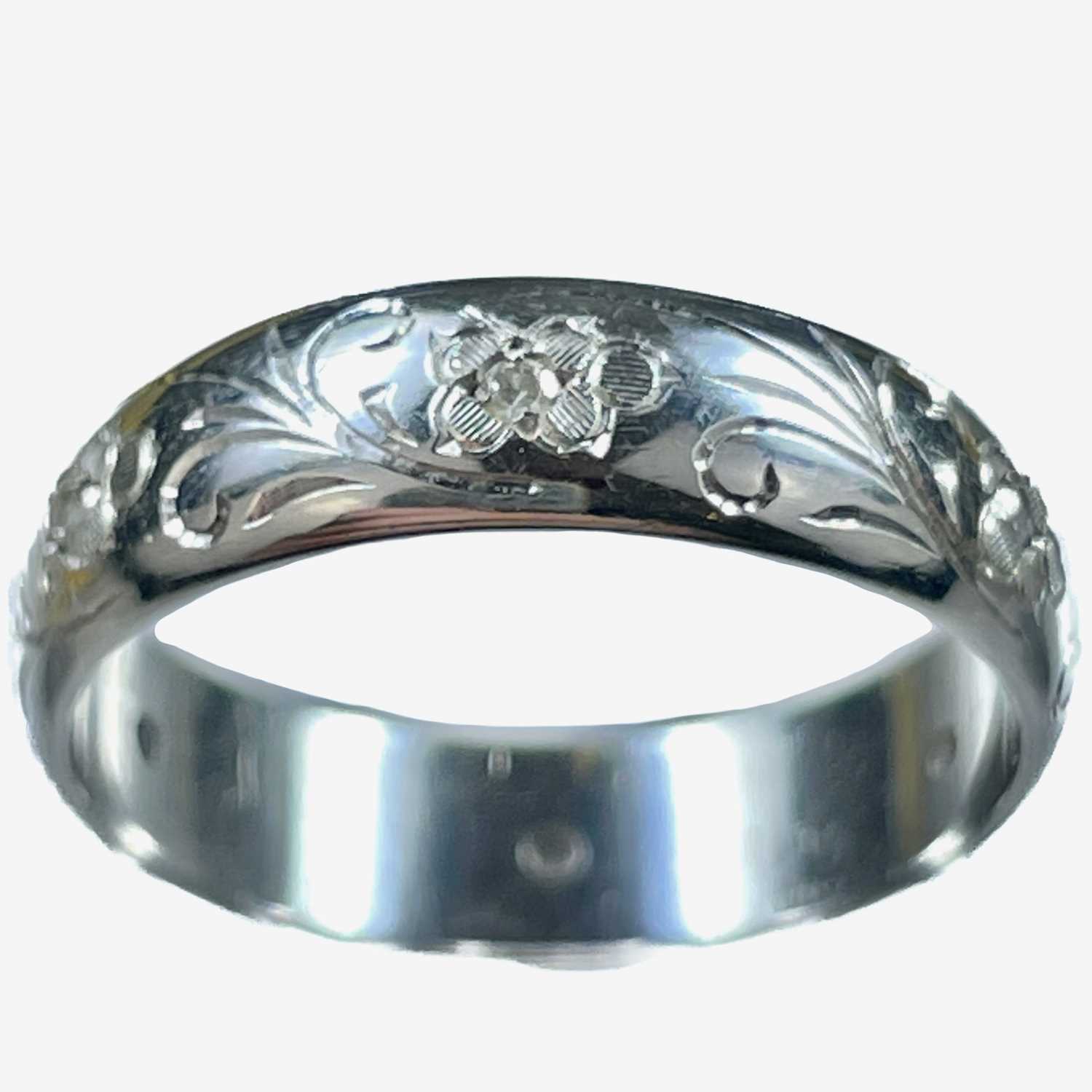 Lot 50 - A modern 18ct white gold diamond set band