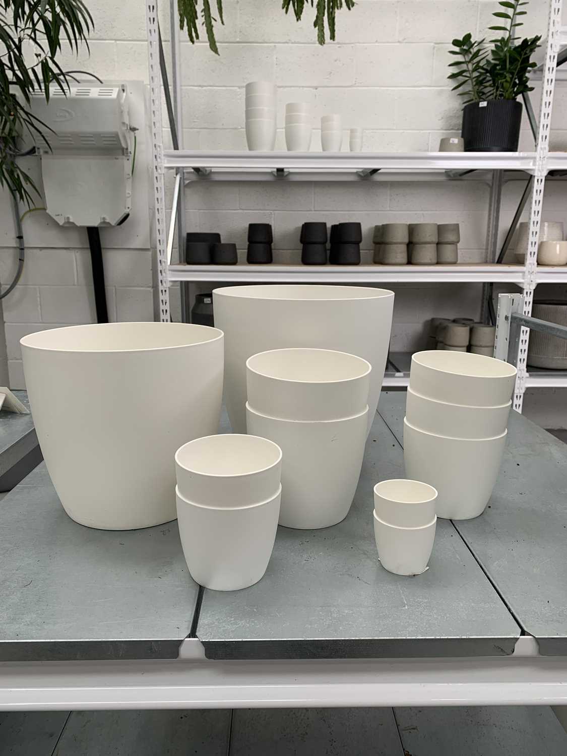 Lot 281 - Mixed white plastic 'elho' pots. 30cm 25cm