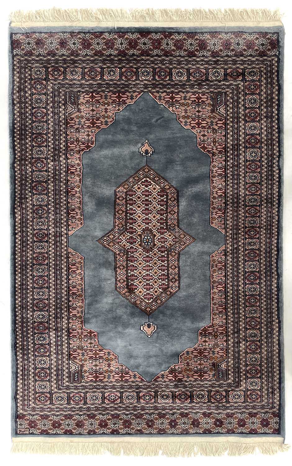 Lot 1275 - A Pakistan rug, signed,