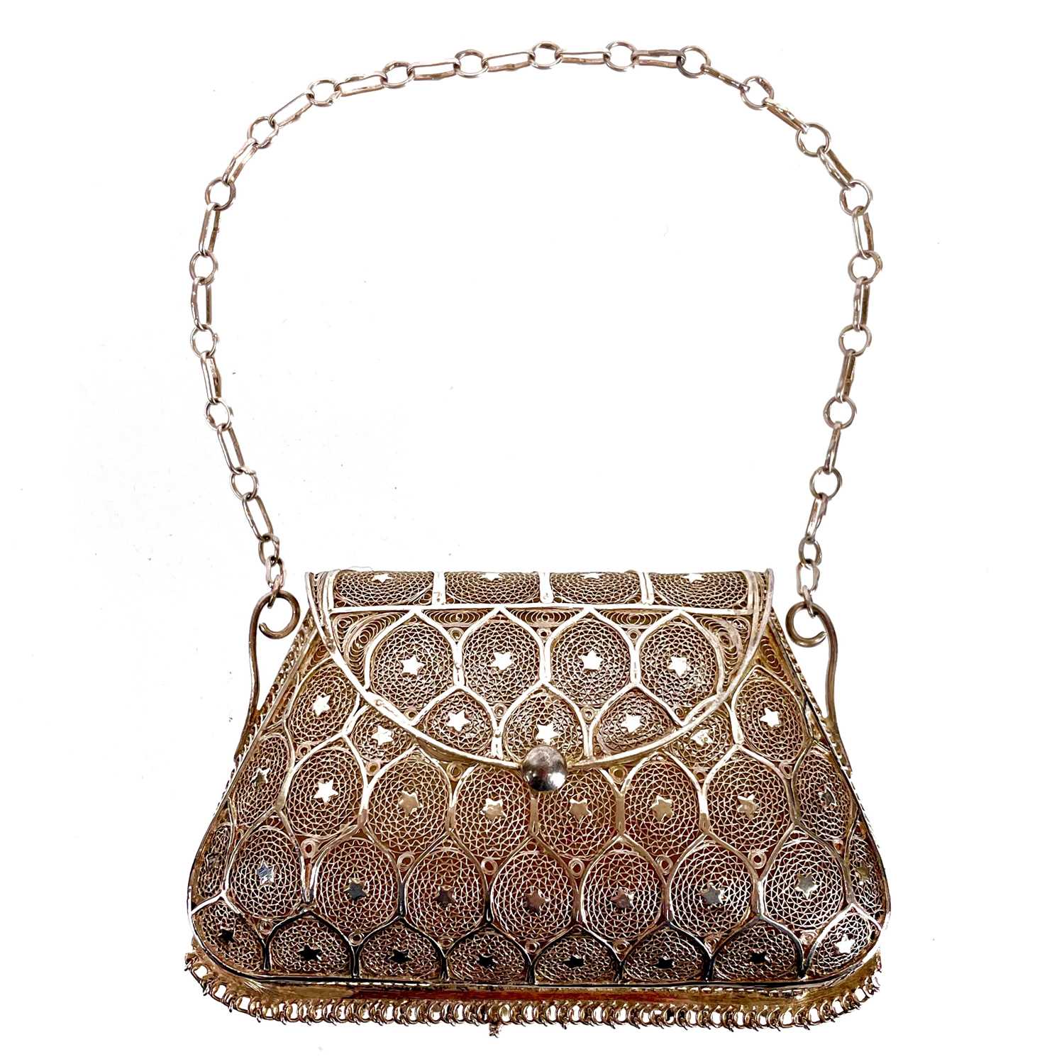Lot 1045 - An Indian silver filigree purse.