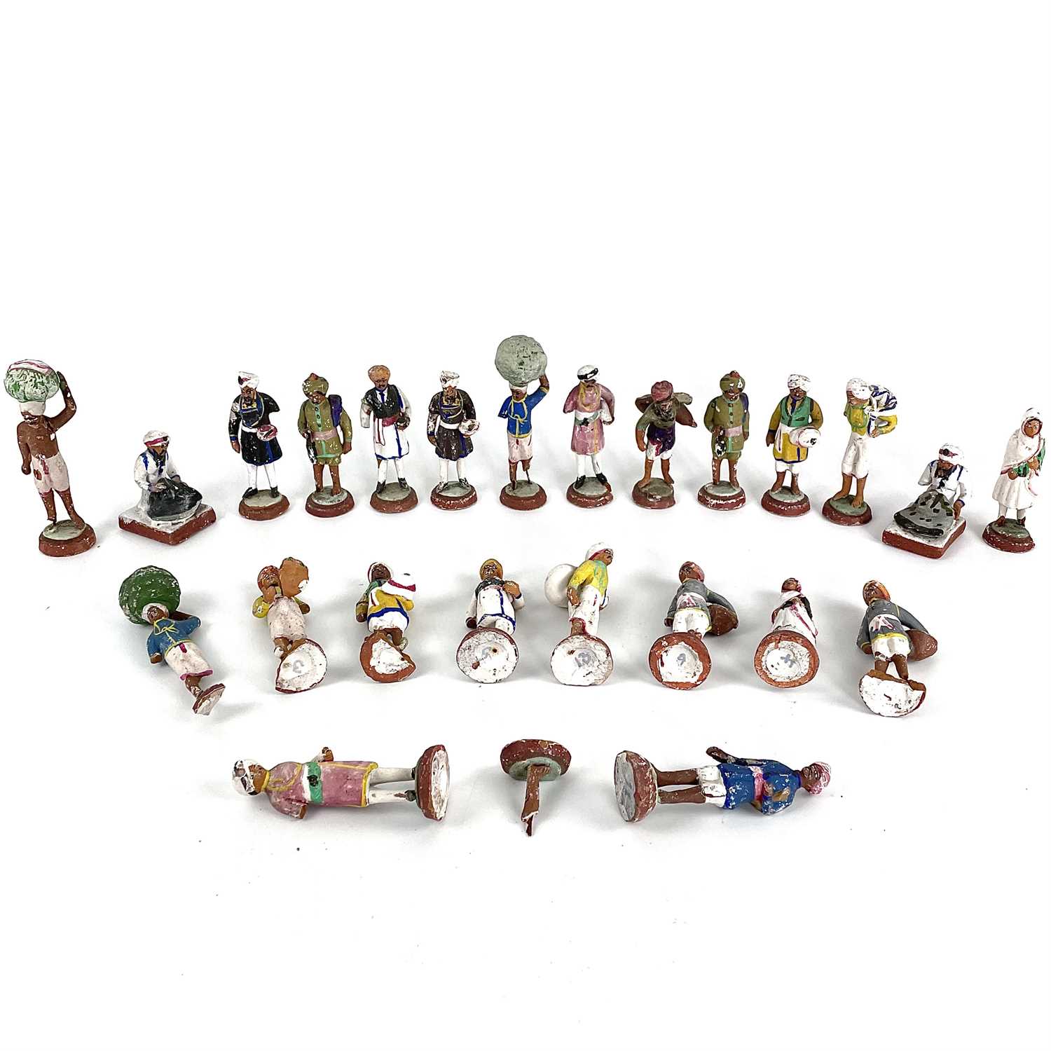 Lot 1050 - A collection of twenty-four Indian plaster