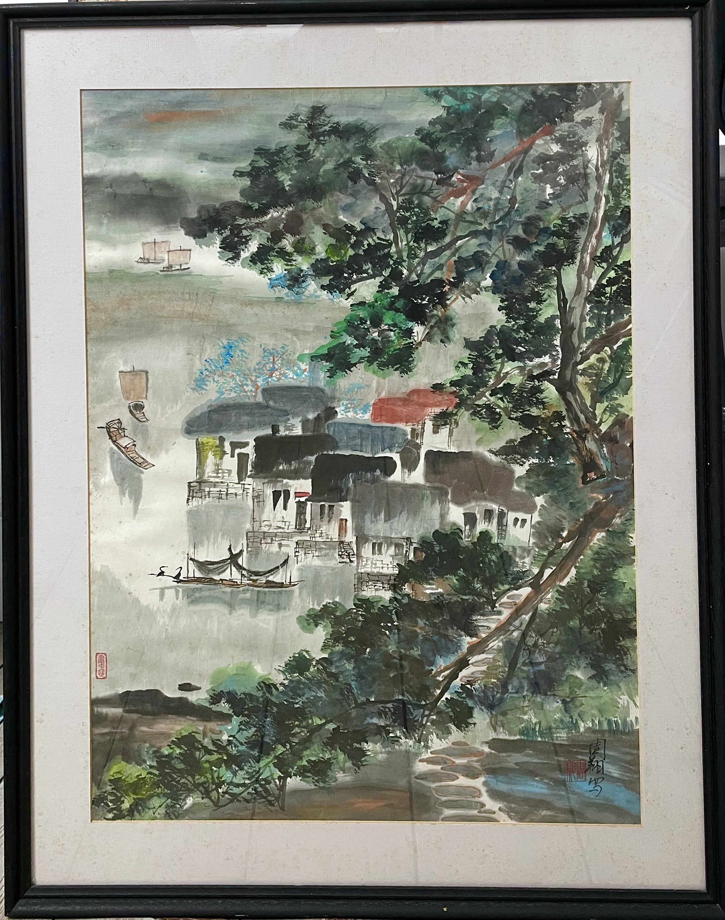Lot 136 - A Chinese painting depicting a river scene,