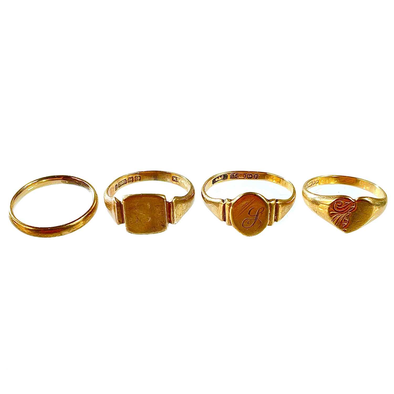 Lot 132 - Four 9ct gold rings.