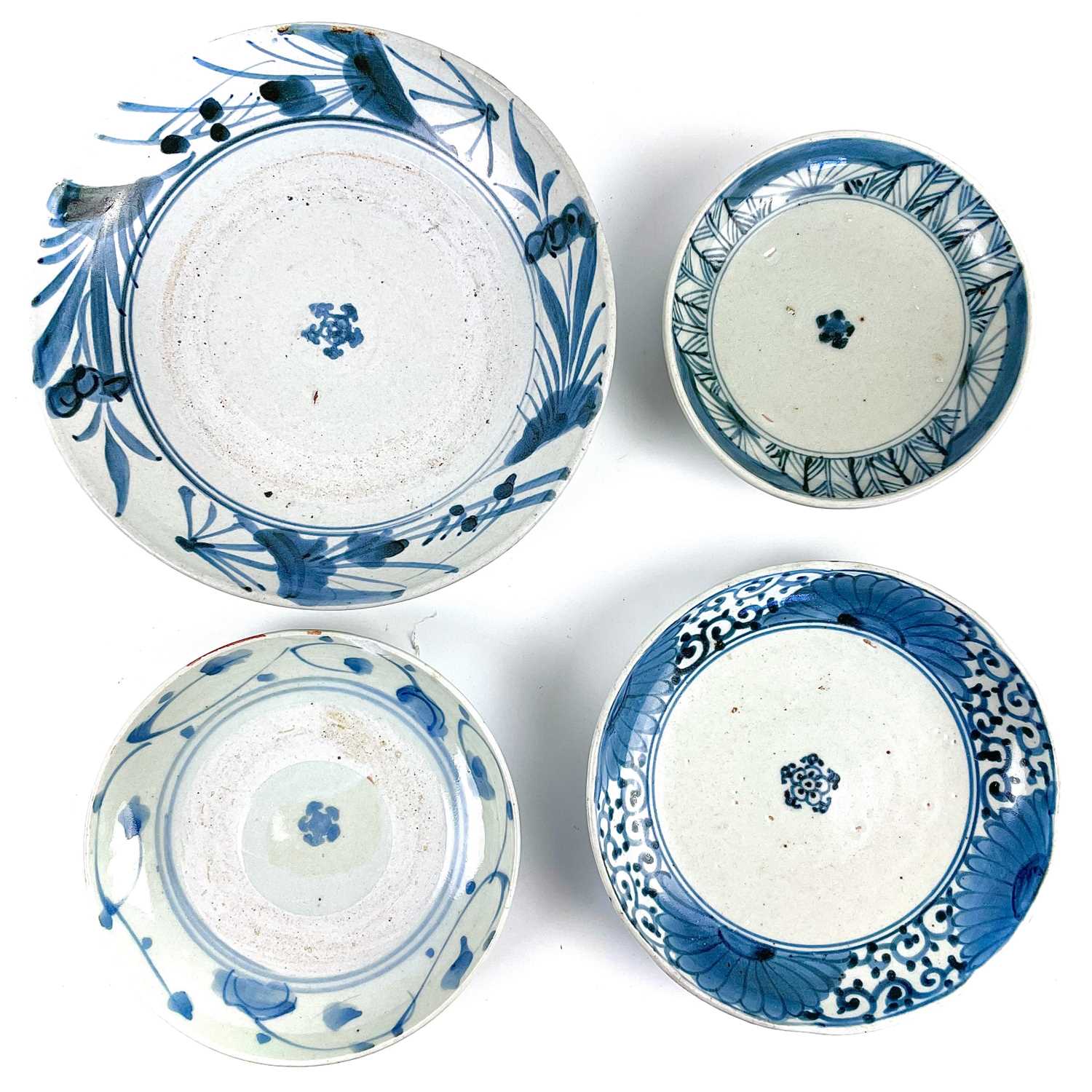 Lot 467 - Four Chinese blue and white plates, Ming