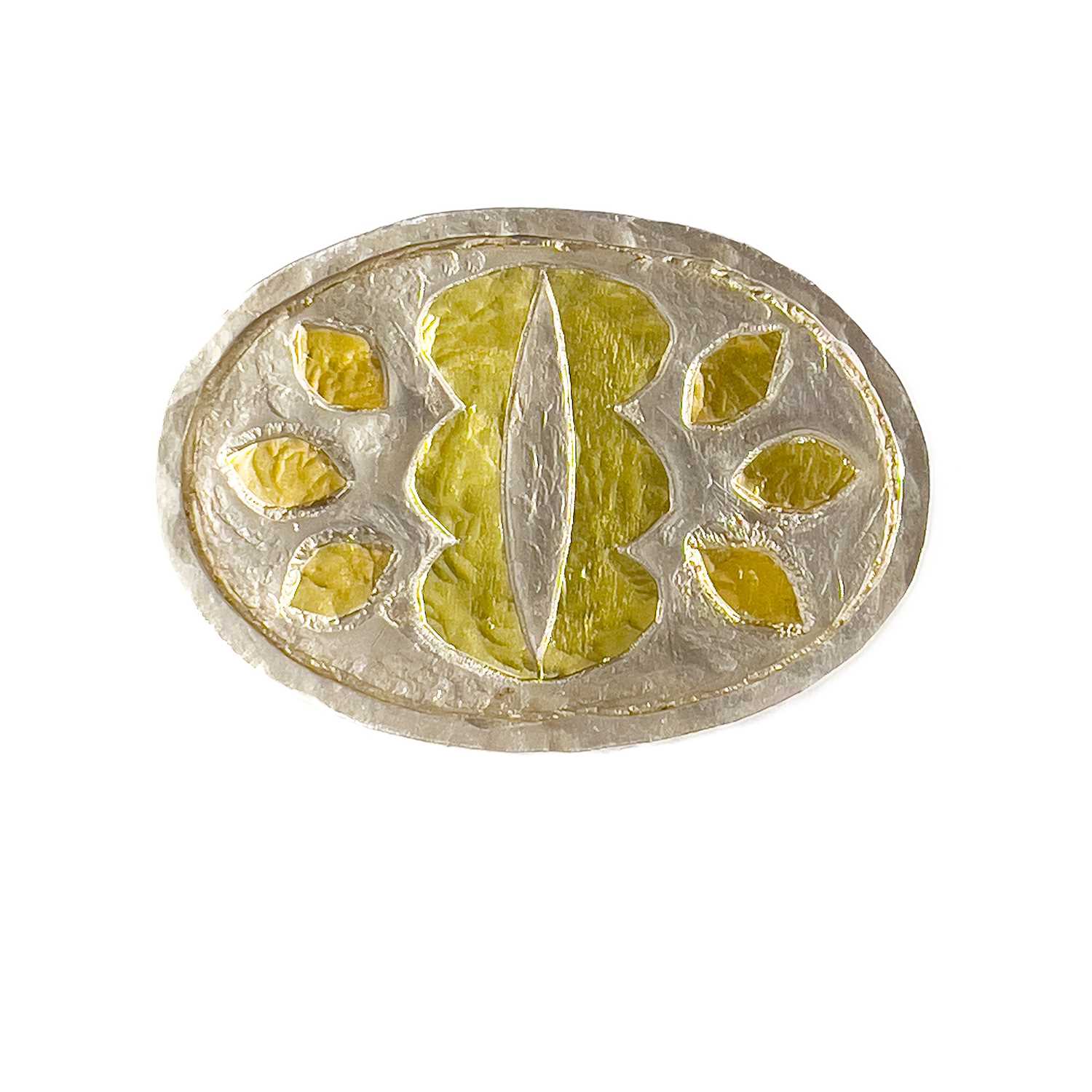 Lot 6 - A contemporary silver and gold applied oval