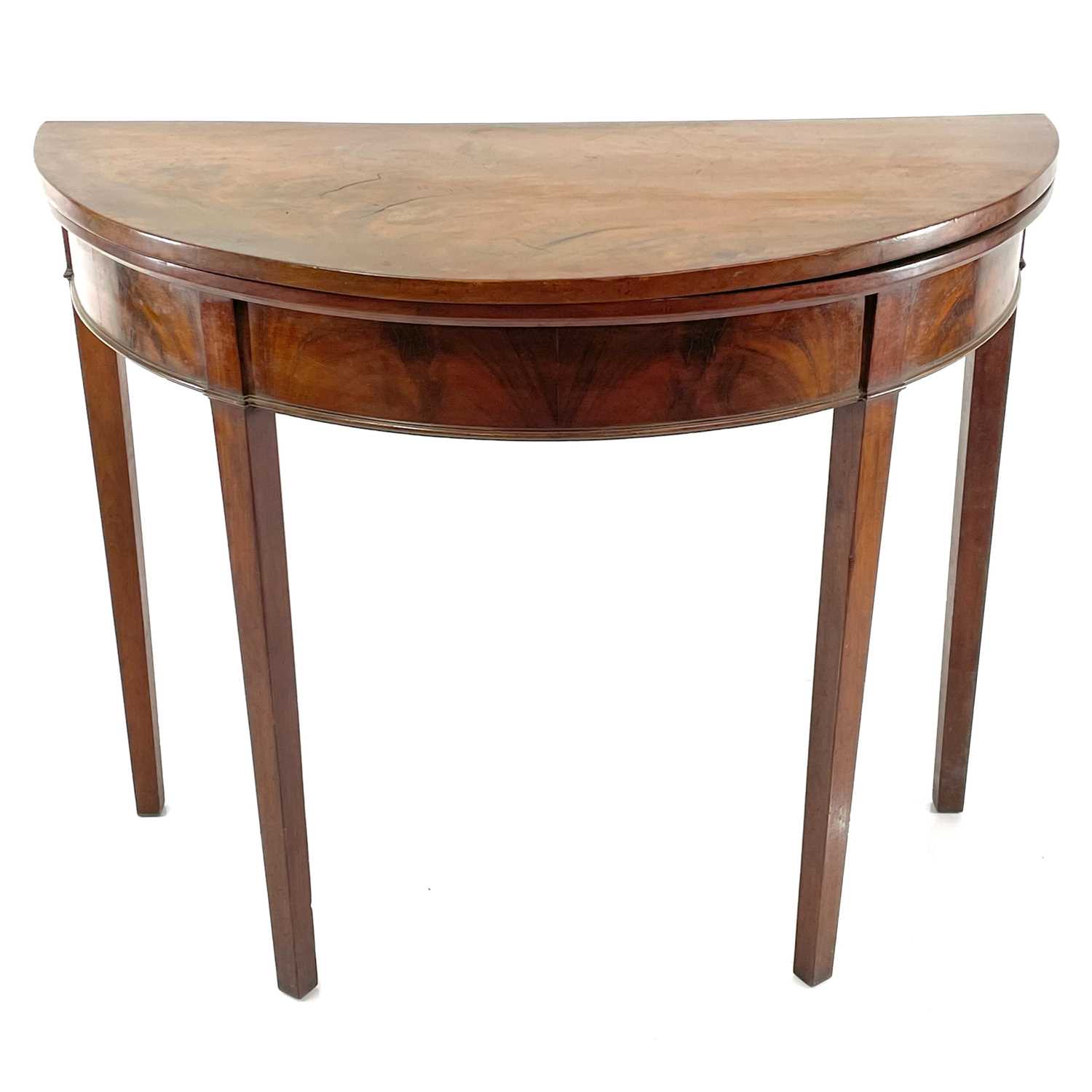 Lot 1837 - A George III mahogany half round fold top