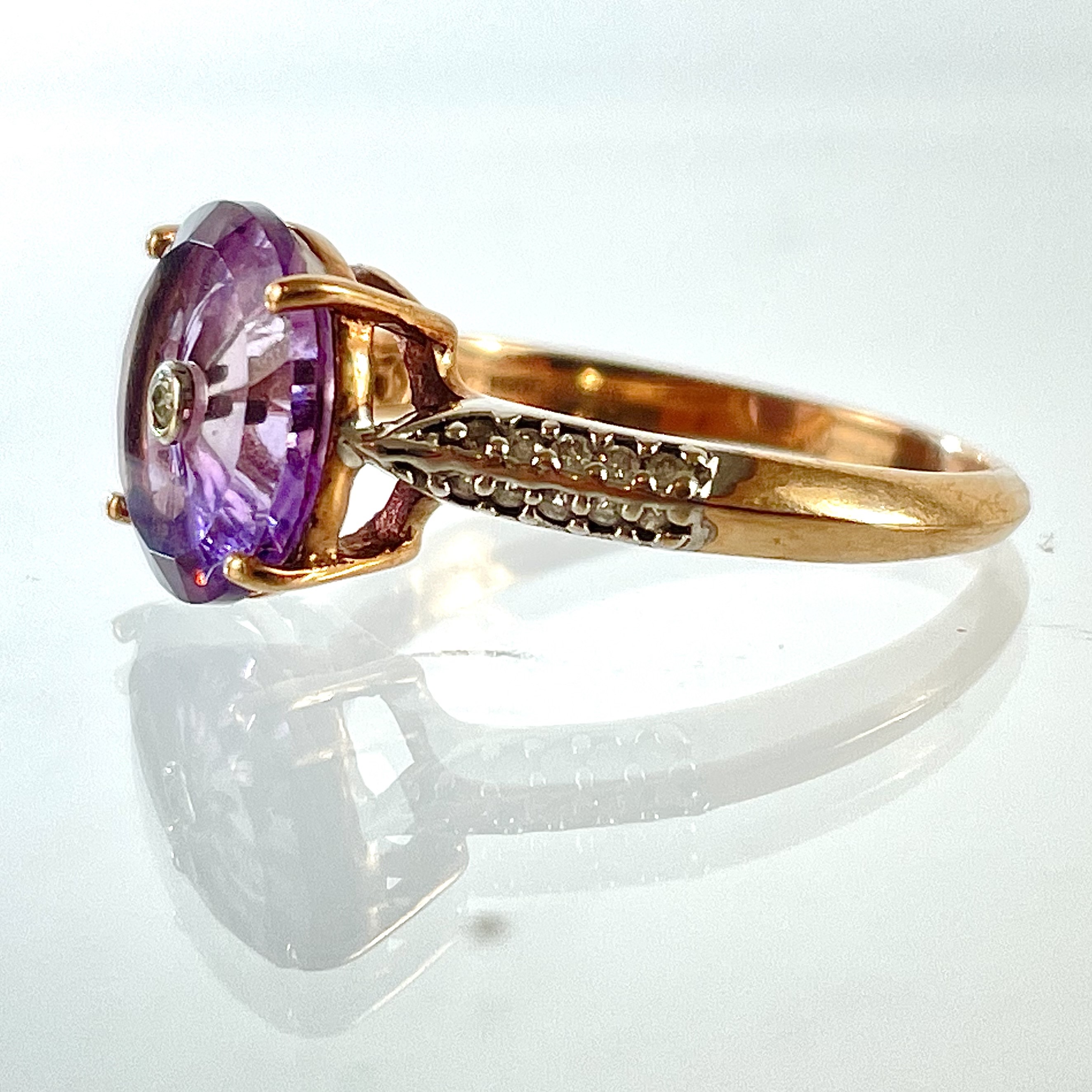 Lot 548 - A Glenn Lehrer 9ct rose gold amethyst and