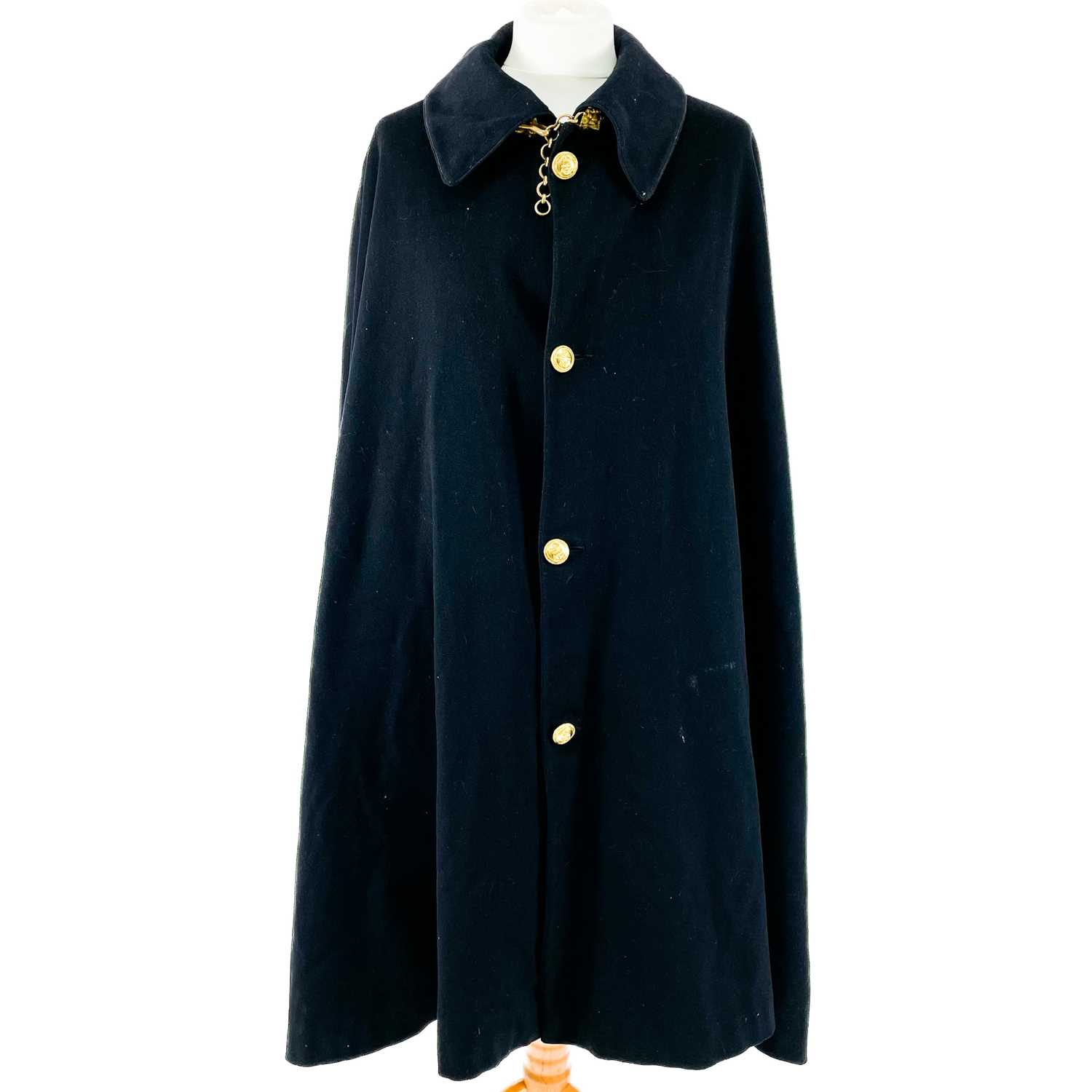 Lot 440 - A Royal Navy Officers' boat cape with brass