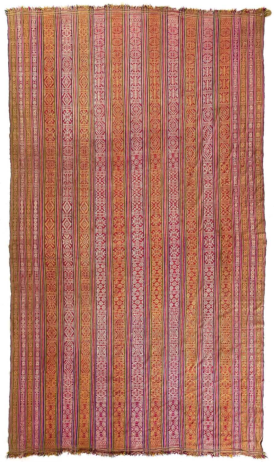 Lot 85 - A Bhutanese silk and wool kira.