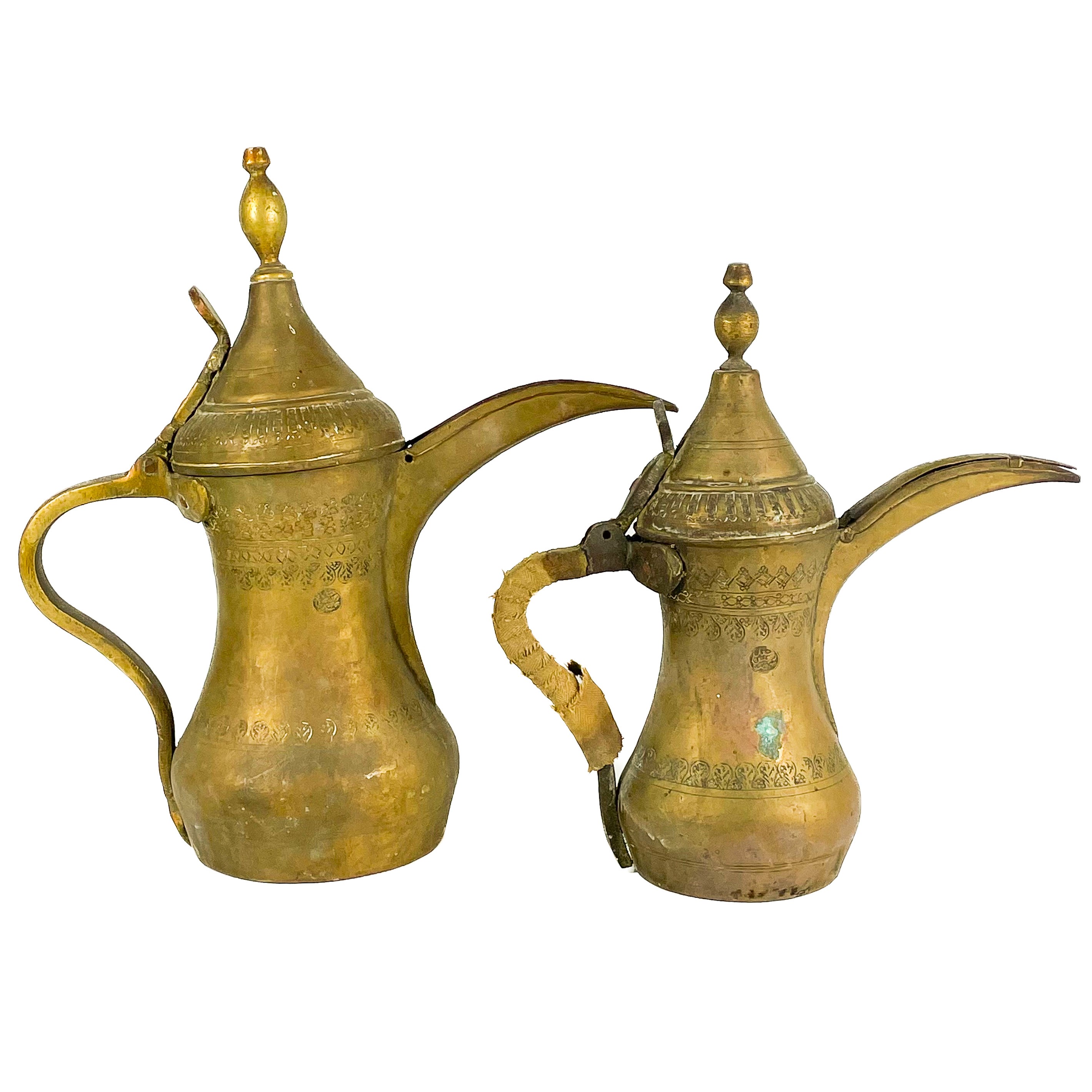 Lot 29 - Two Saudi Arabian brass dallah pots, 19th