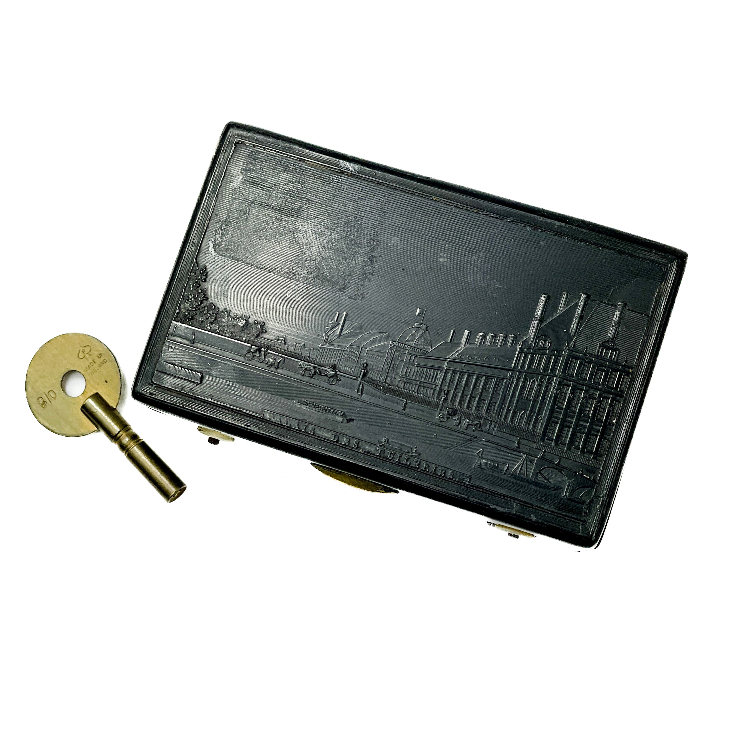 Lot 42 - A French pressed horn pocket music box.