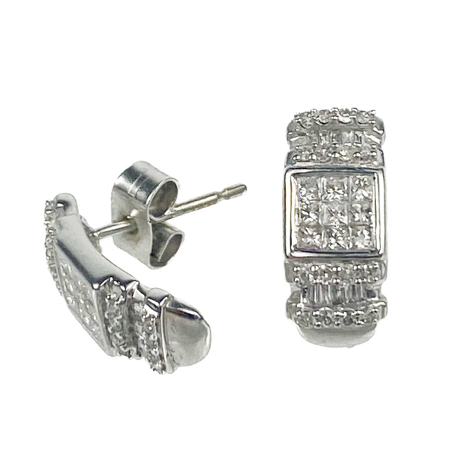 Lot 161 - A pair of 9ct white gold pavé diamond set