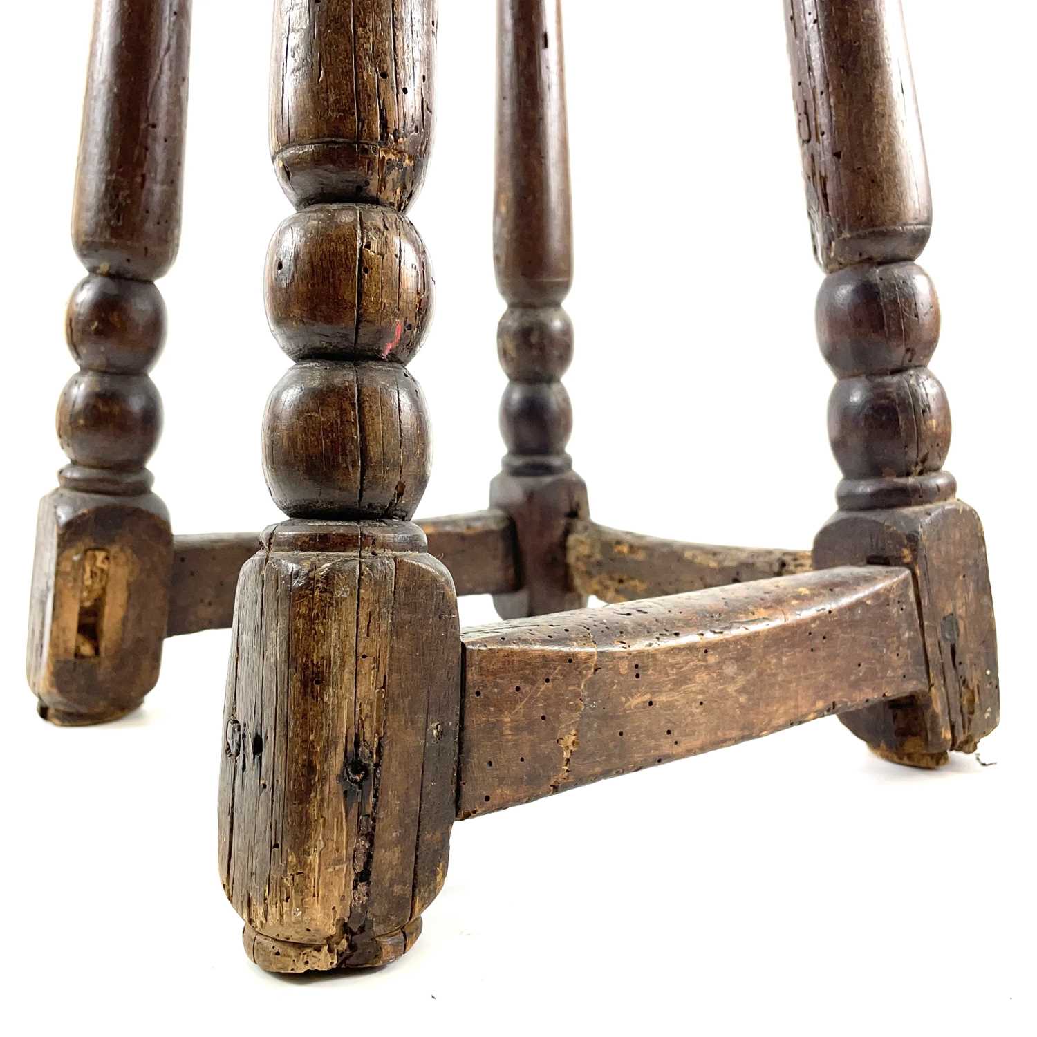Lot 195 - A walnut square joined stool.