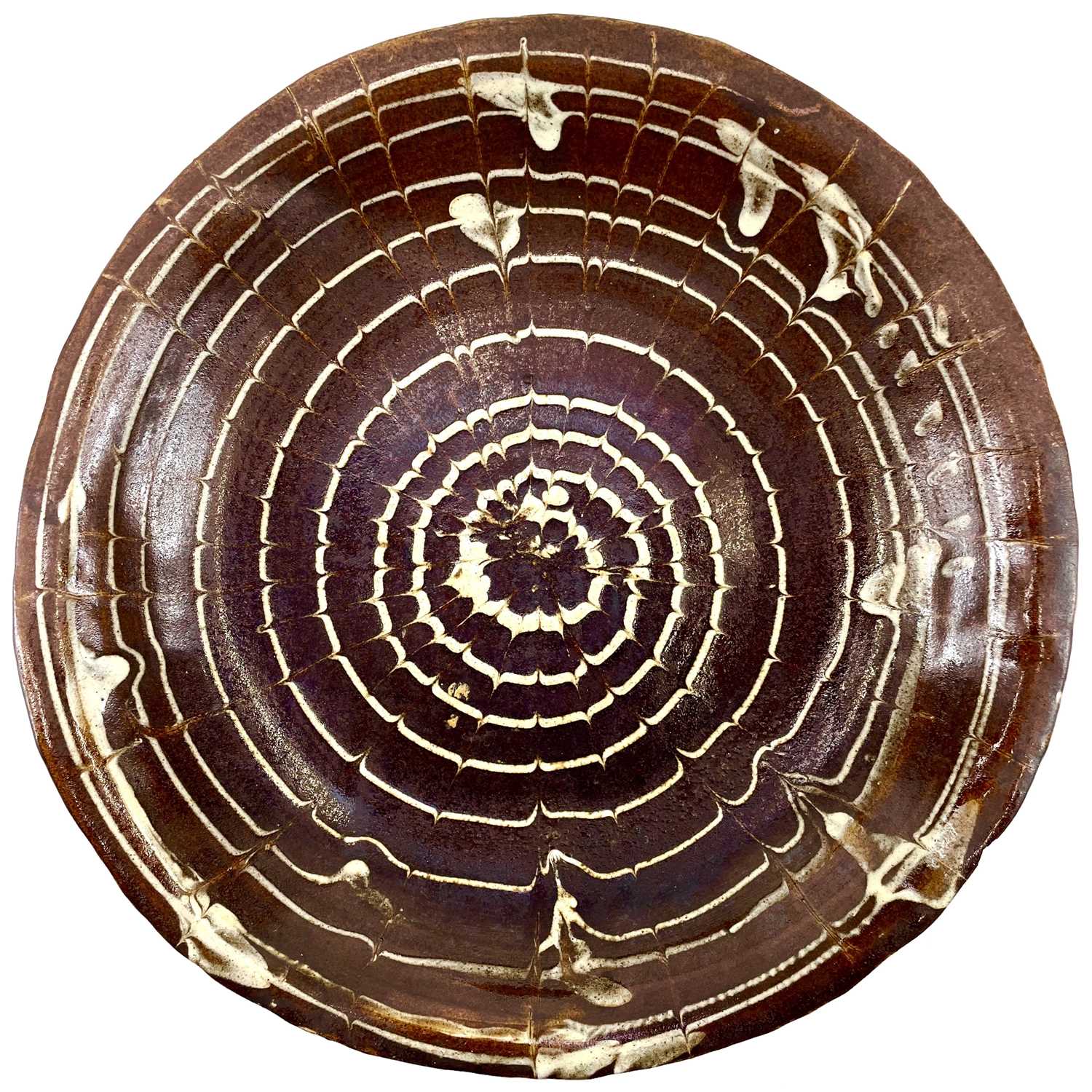 Lot 225 - A 19th century circular slipware dish with