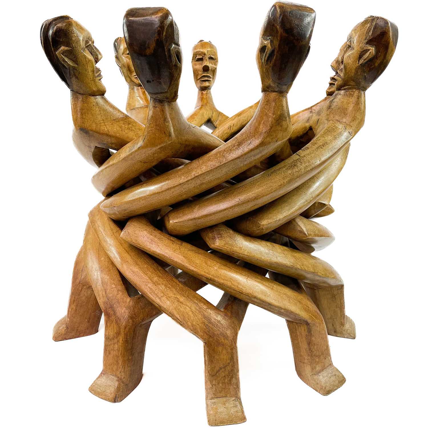 Lot 251 - An African nine headed unity stand.