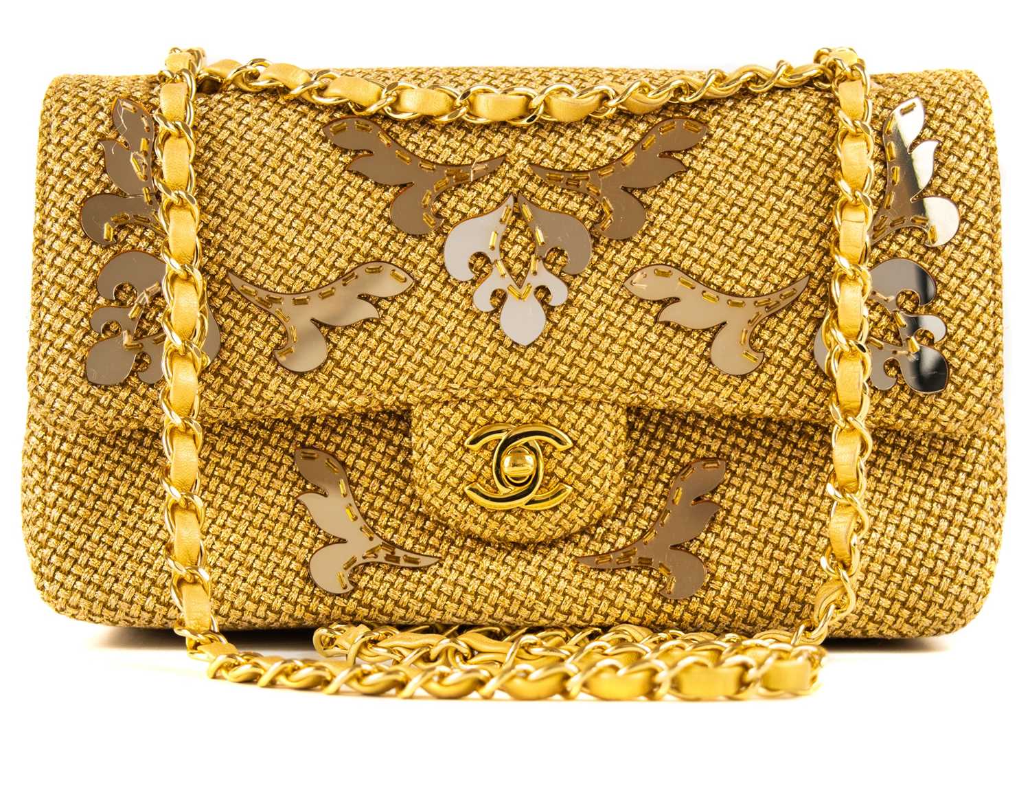 Lot 327 - A Chanel gold woven raffia 'Cruise