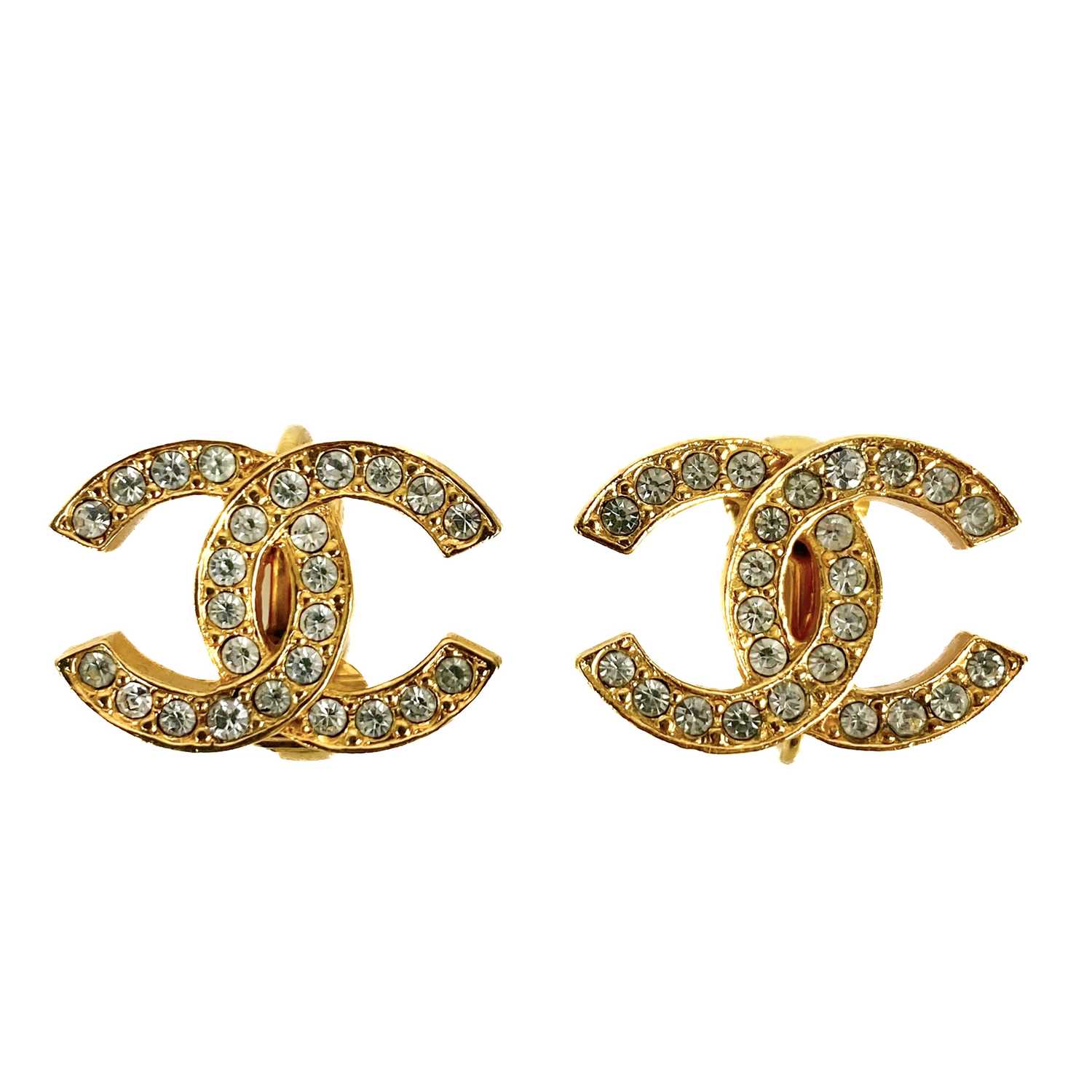 Lot 376 - A pair of Chanel CC gold plated crystal set