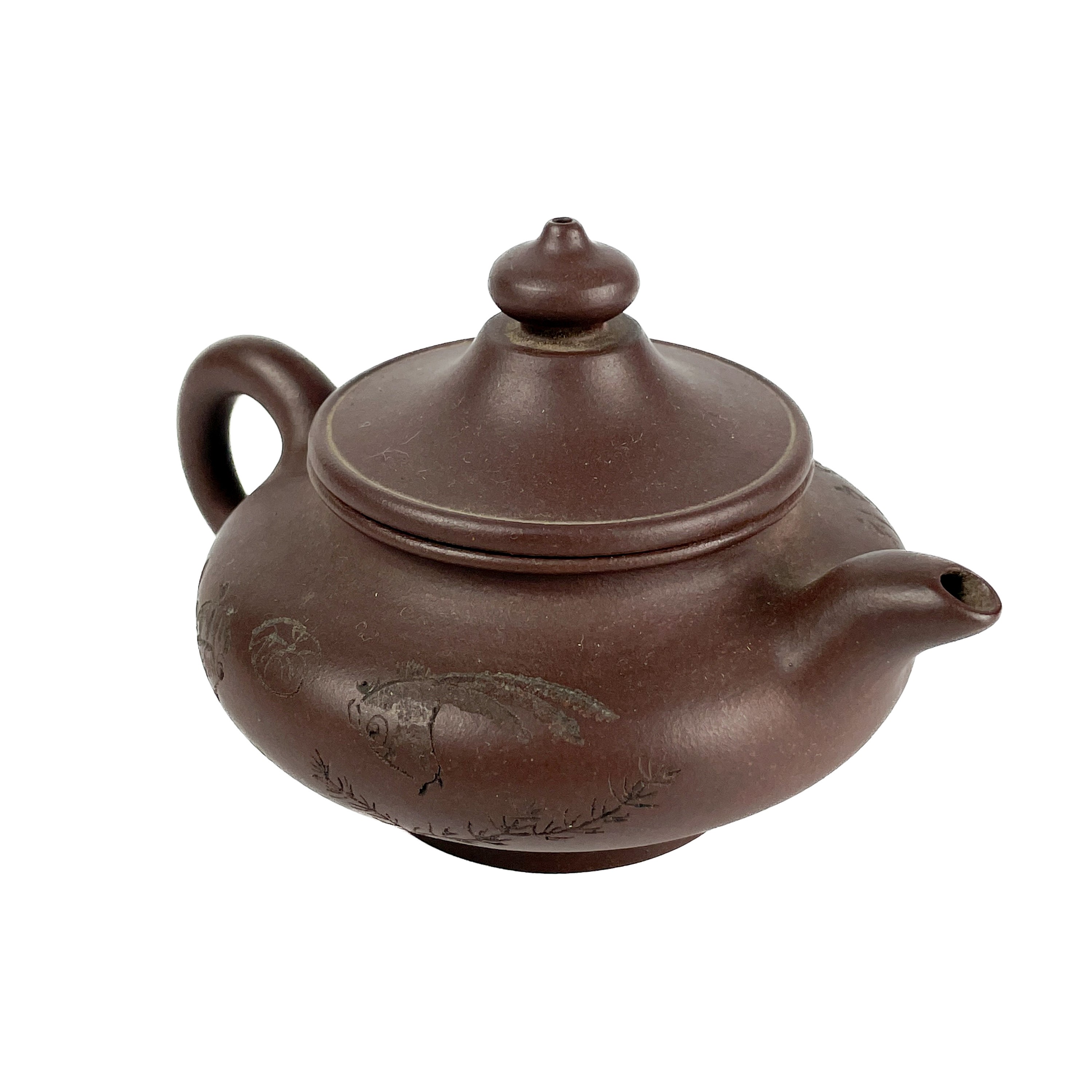 Lot 252 - A Chinese Yixing pottery teapot.