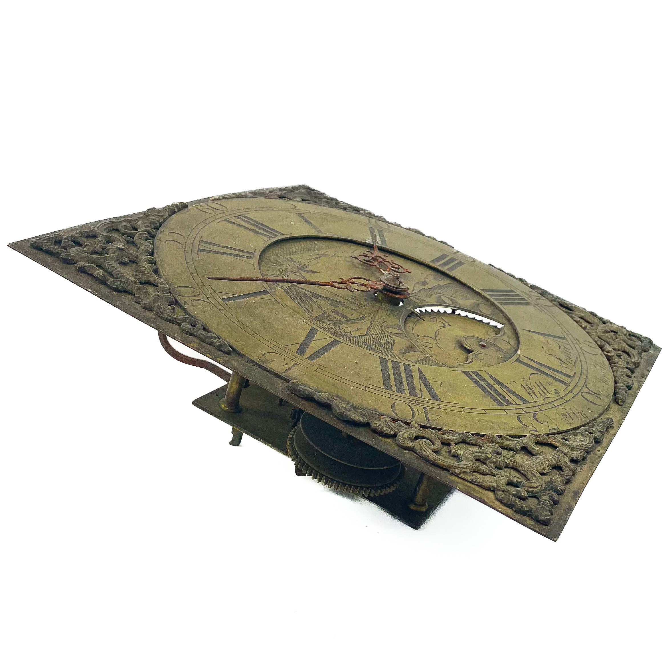 Lot 1712 - A Georgian brass 30-hour clock face and