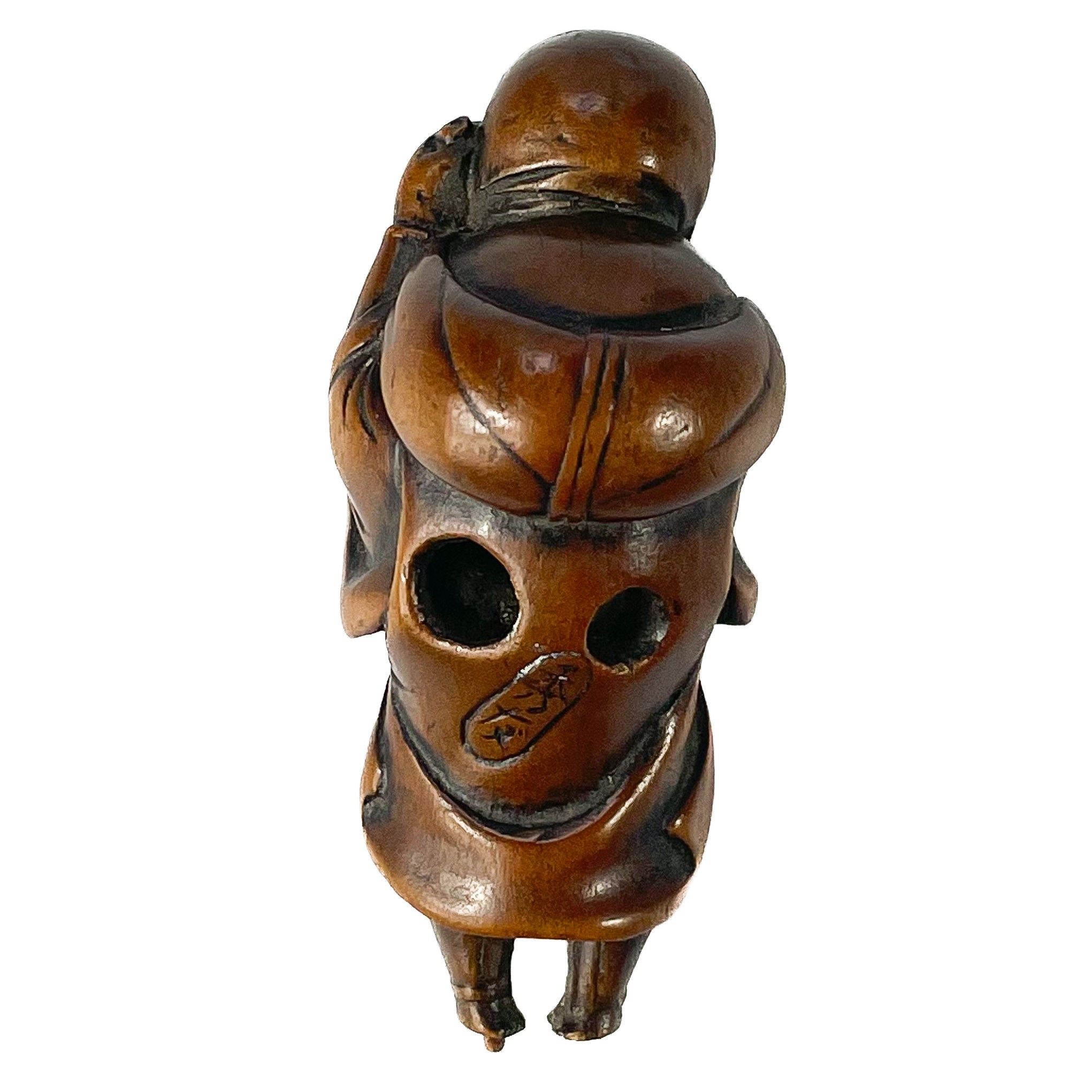 Lot 279 - A Japanese carved wood netsuke, Meiji period,