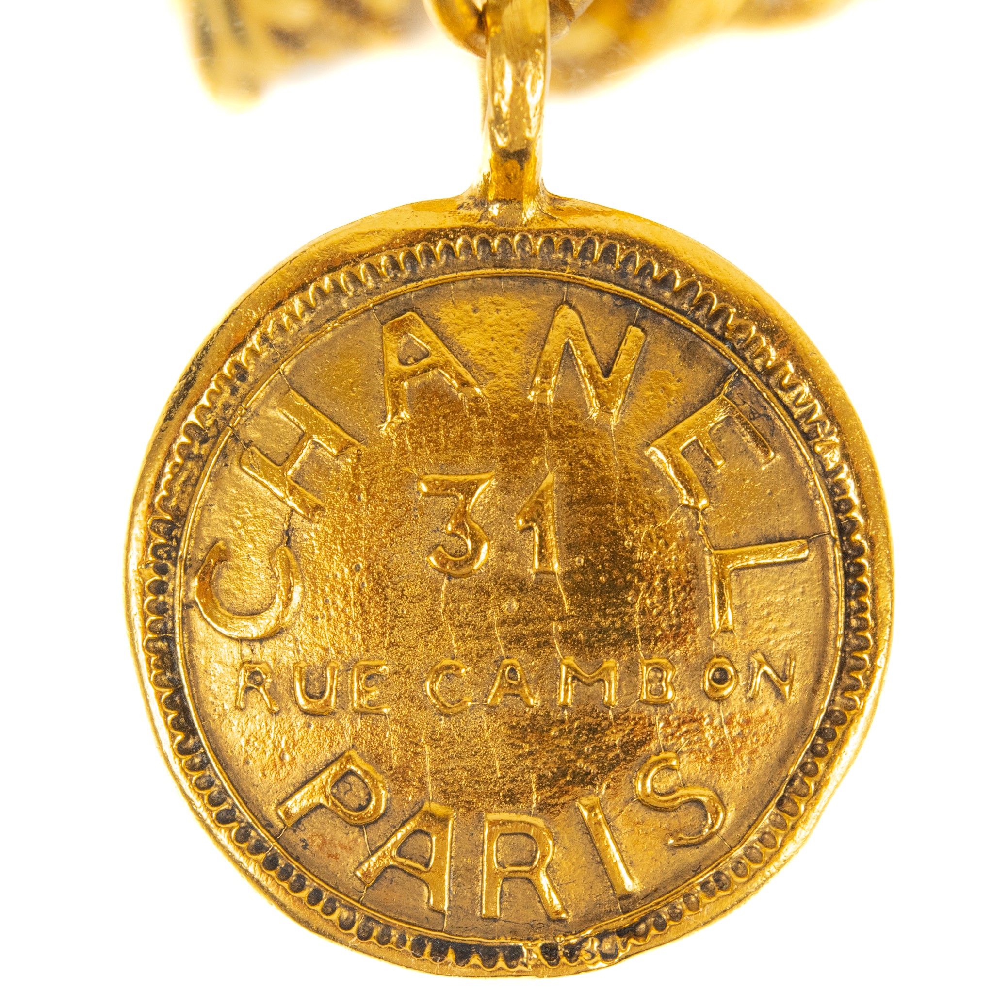 Lot 333 - A Chanel gold tone medallion pendant