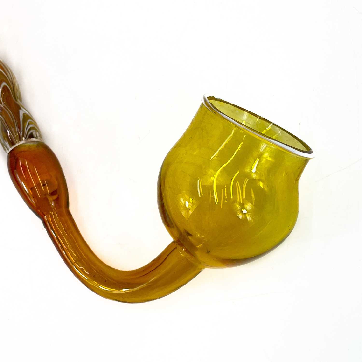 Lot 920 - A Victorian Nailsea type amber glass pipe.