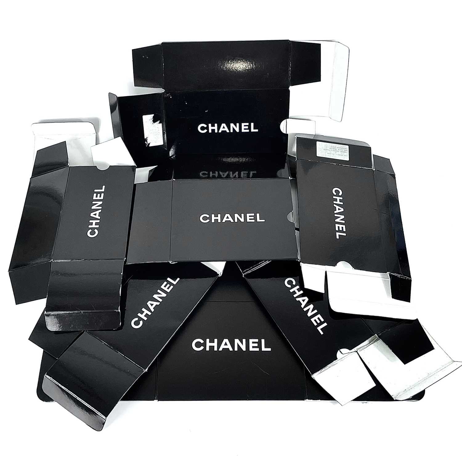 Lot 394 - A selection of seven Chanel retail flat pack