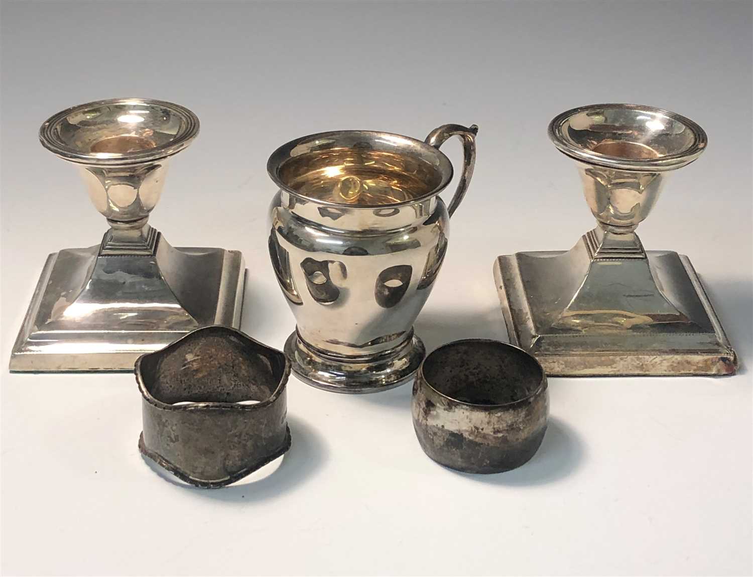 Lot 2025 - A small silver mug together with a pair of