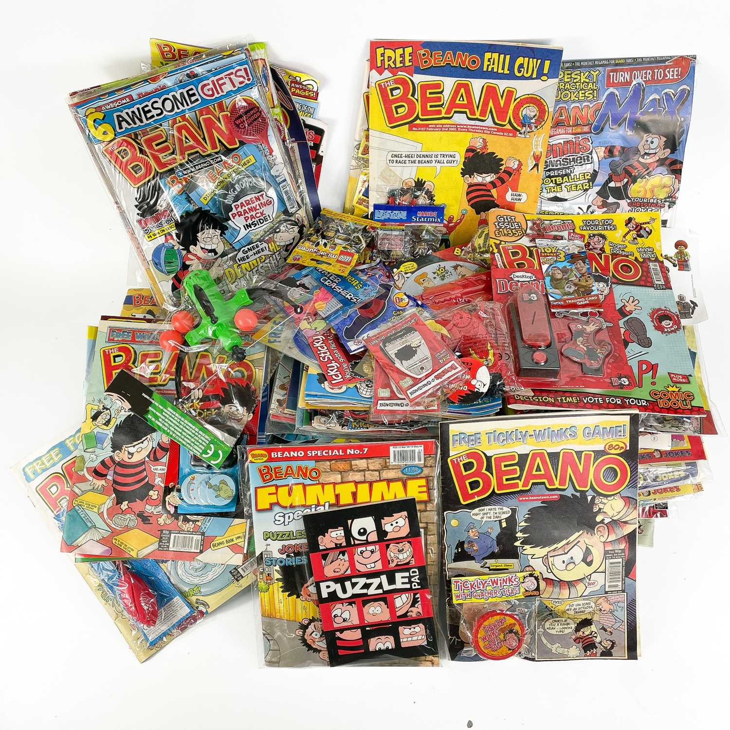 Lot 817 - Beano Comics with Special Gifts in Original