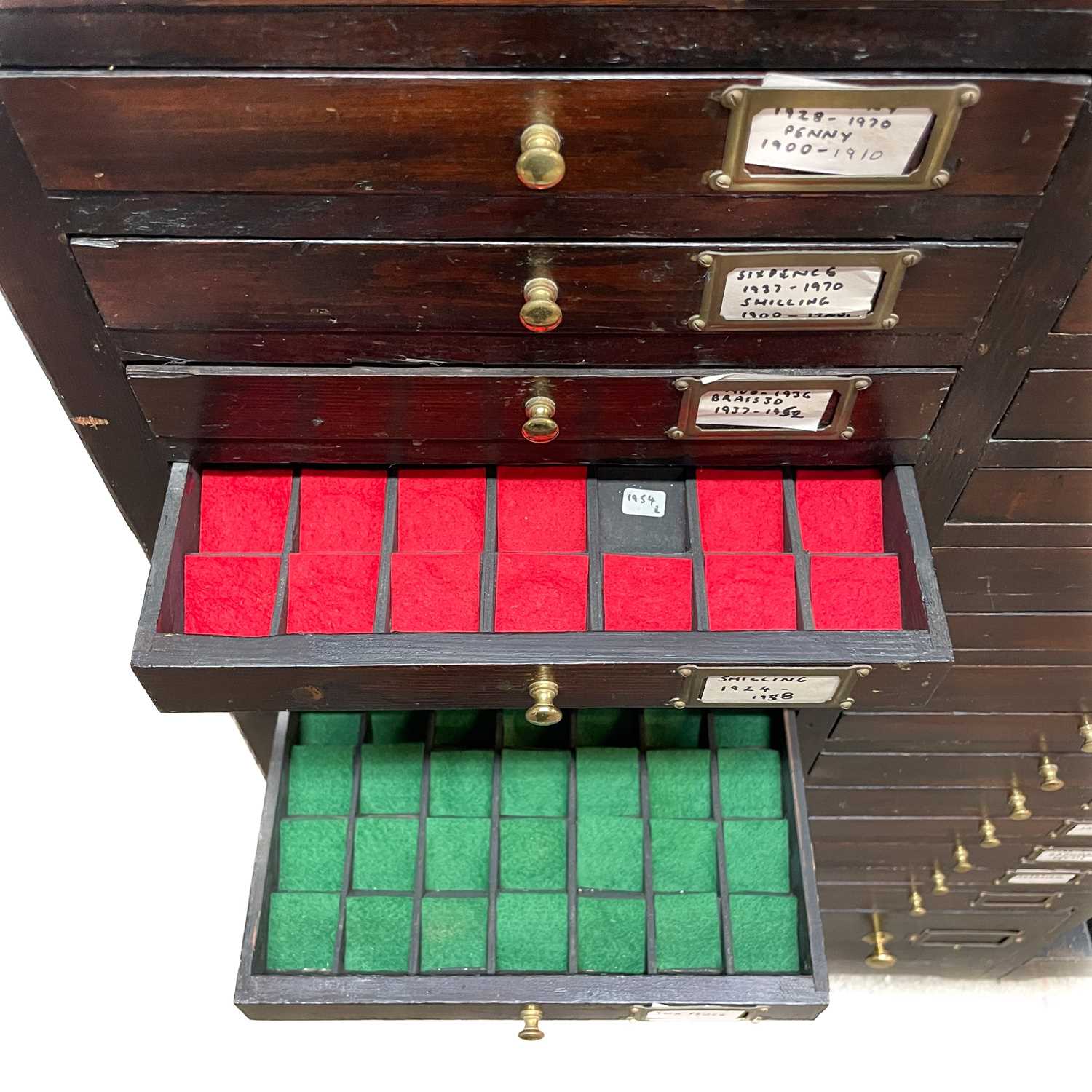 Lot 214 - Wooden 32 drawer coin cabinet.