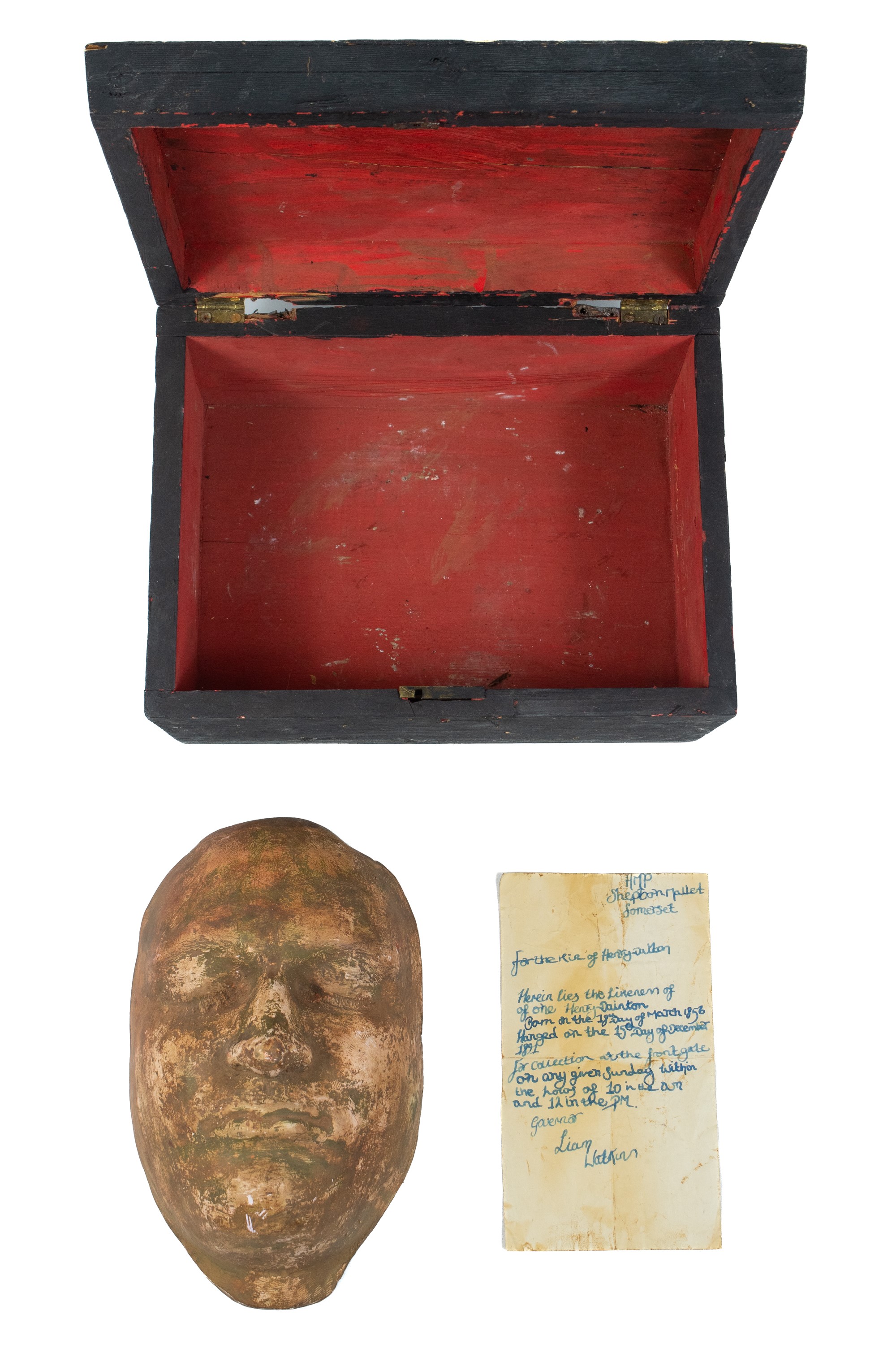 Lot 285 - Death mask of Henry Dainton in a sarcophagus