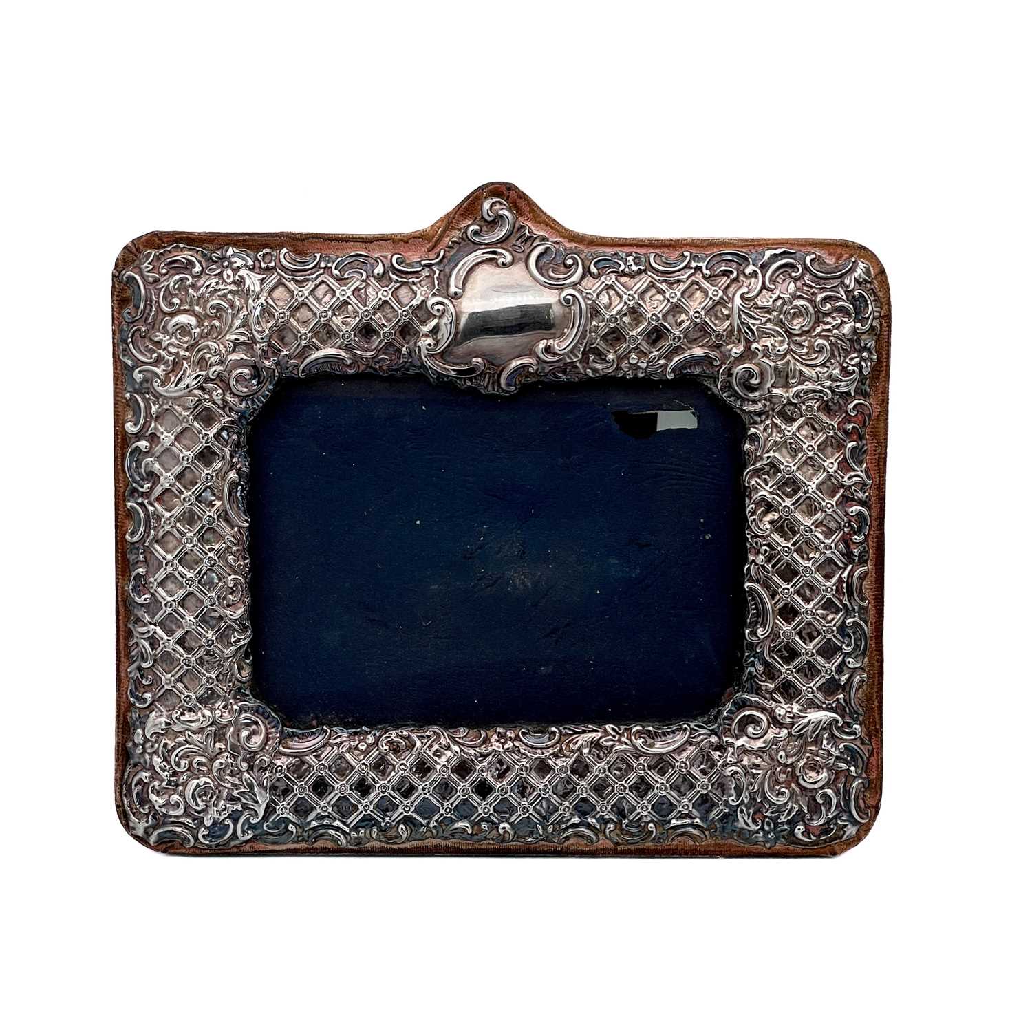 Lot 330 - A modern silver embossed photograph frame by