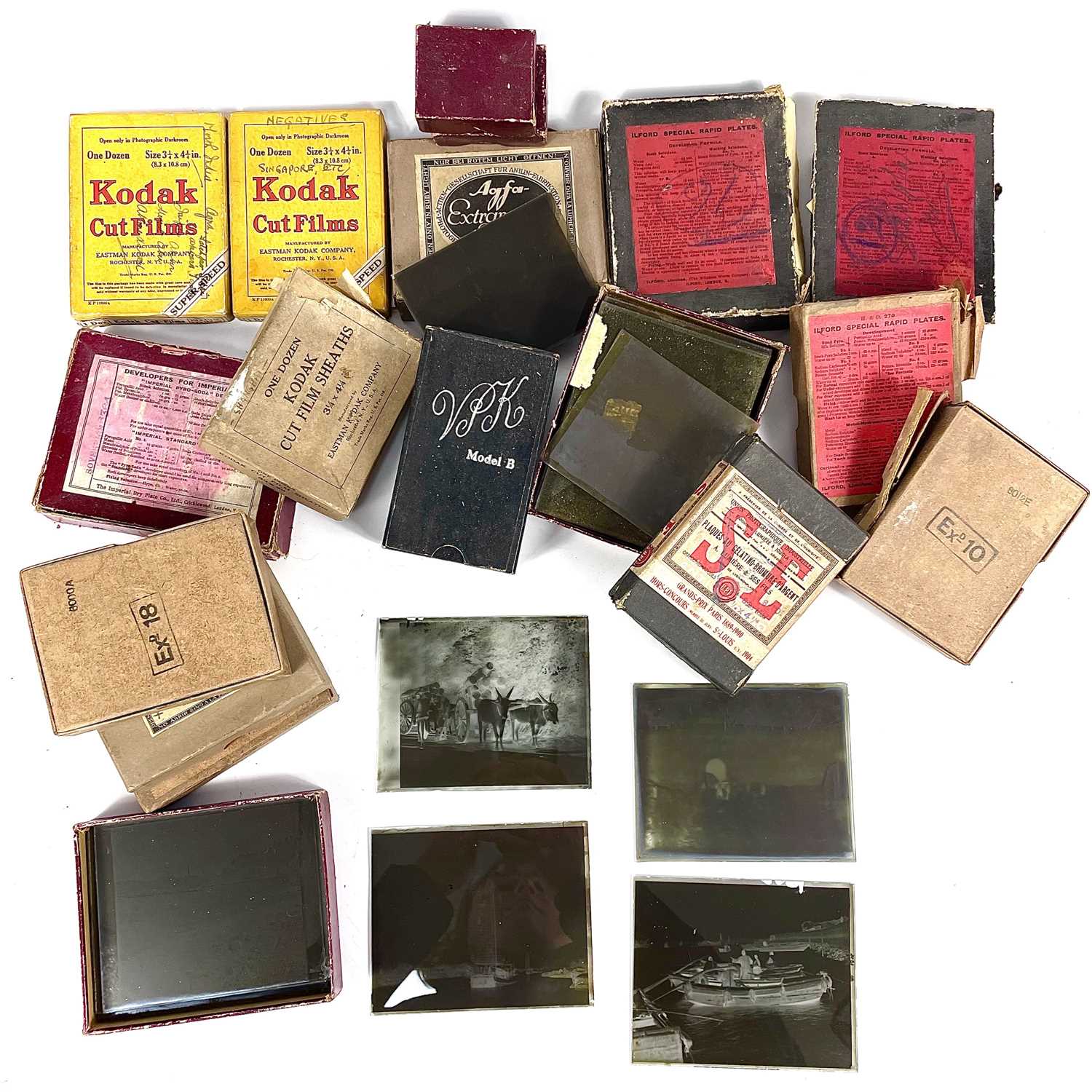 Lot 100 - Seventeen boxes of glass negatives taken by