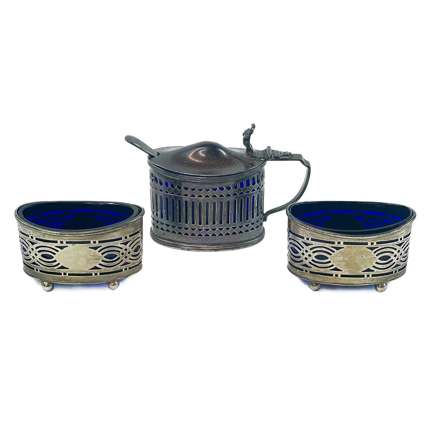 Lot 138 - A silver three piece cruet set with blue