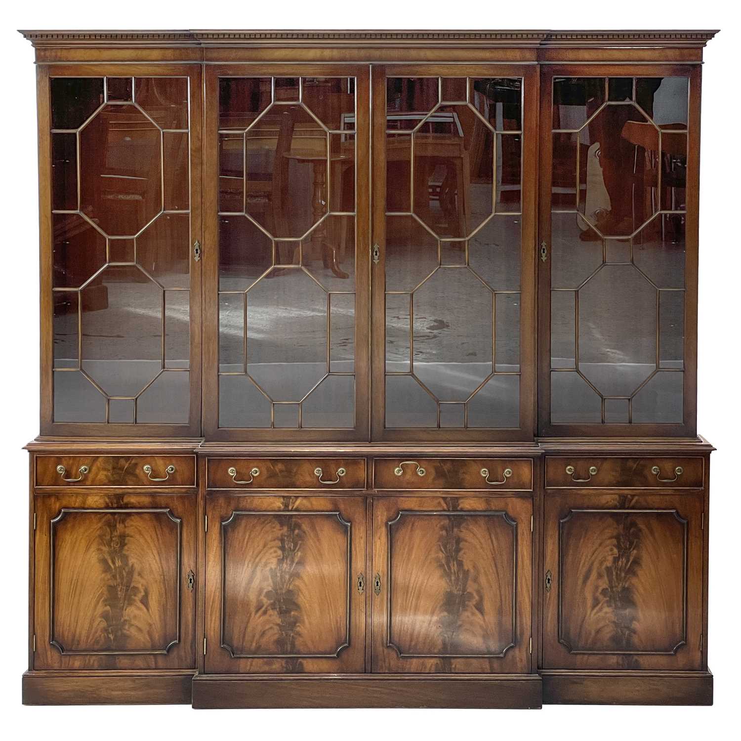 Lot 1891 - A large Georgian style bookcase by Bevan