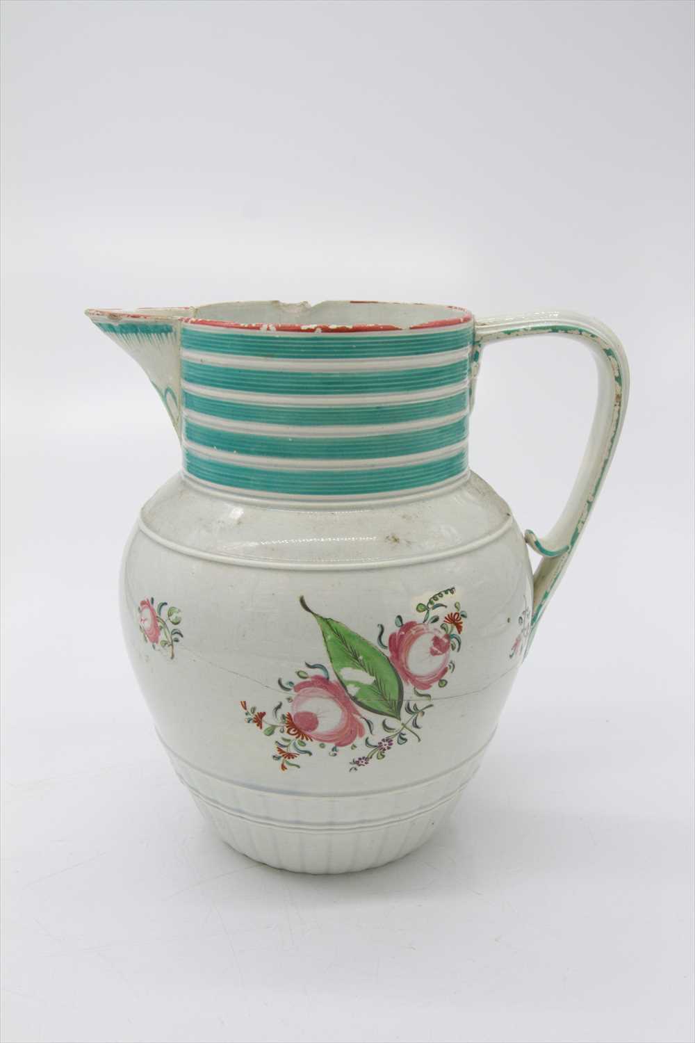 Lot 1446 - An early 19th century pearlware jug, hand