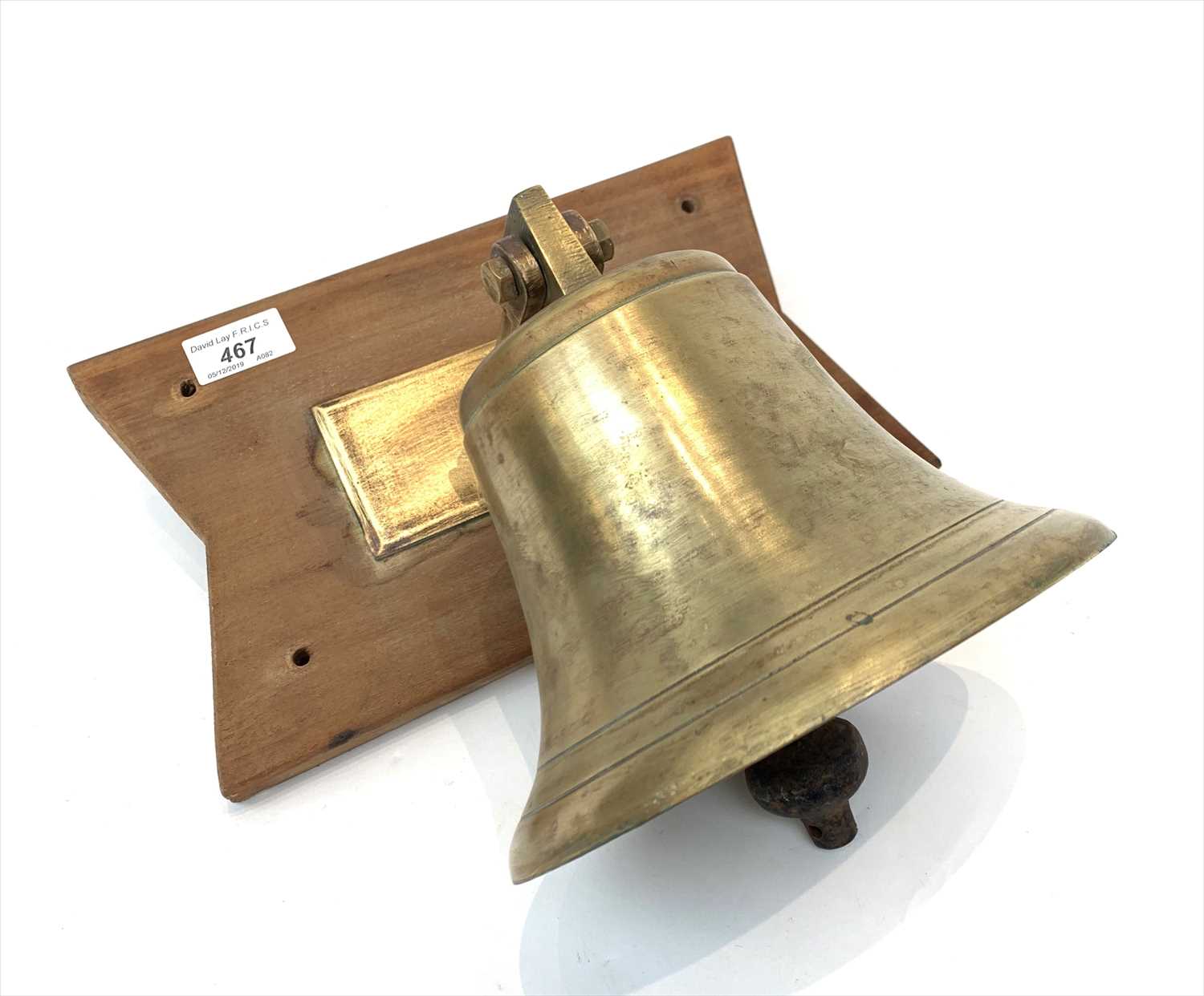 Lot 467 - A brass bell, with iron clanger, brass
