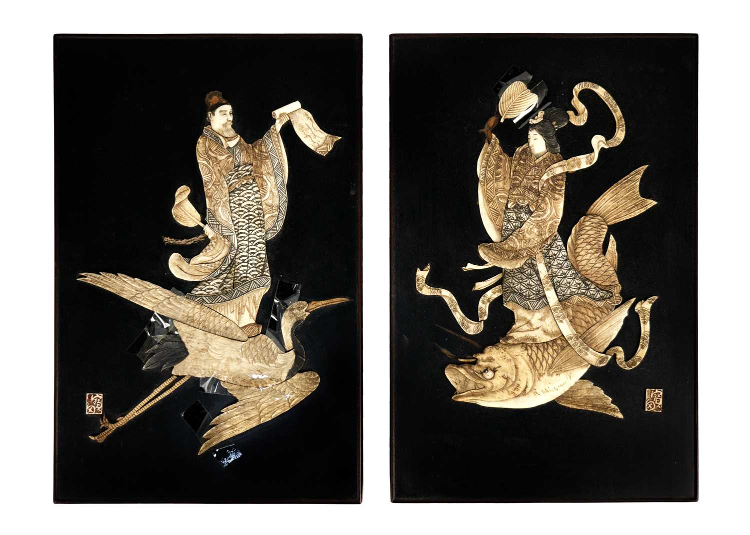 Lot 92 - A pair of Japanese bone decorated ebonised